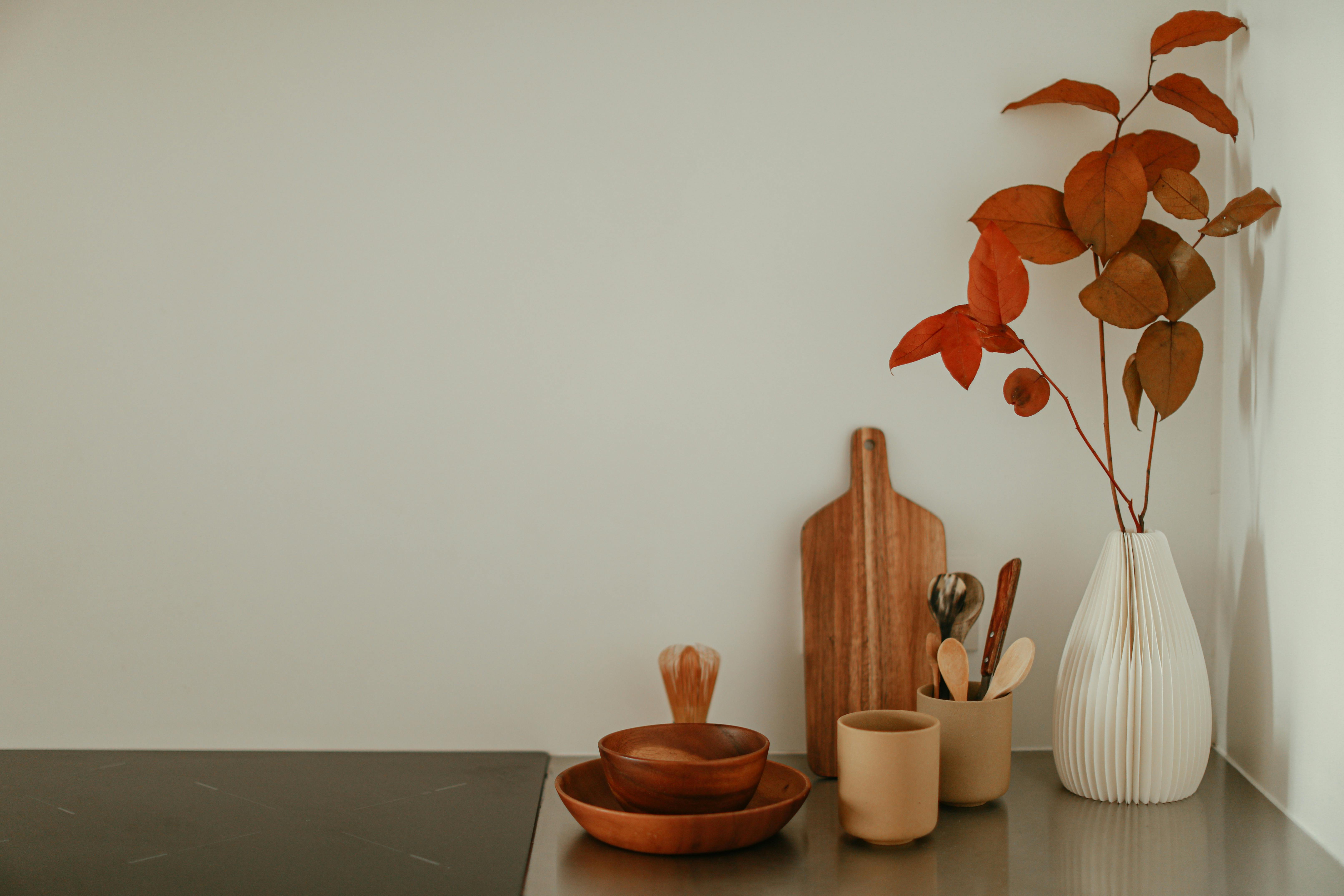 Vase with Plant, Tray and Bowls in Corner · Free Stock Photo