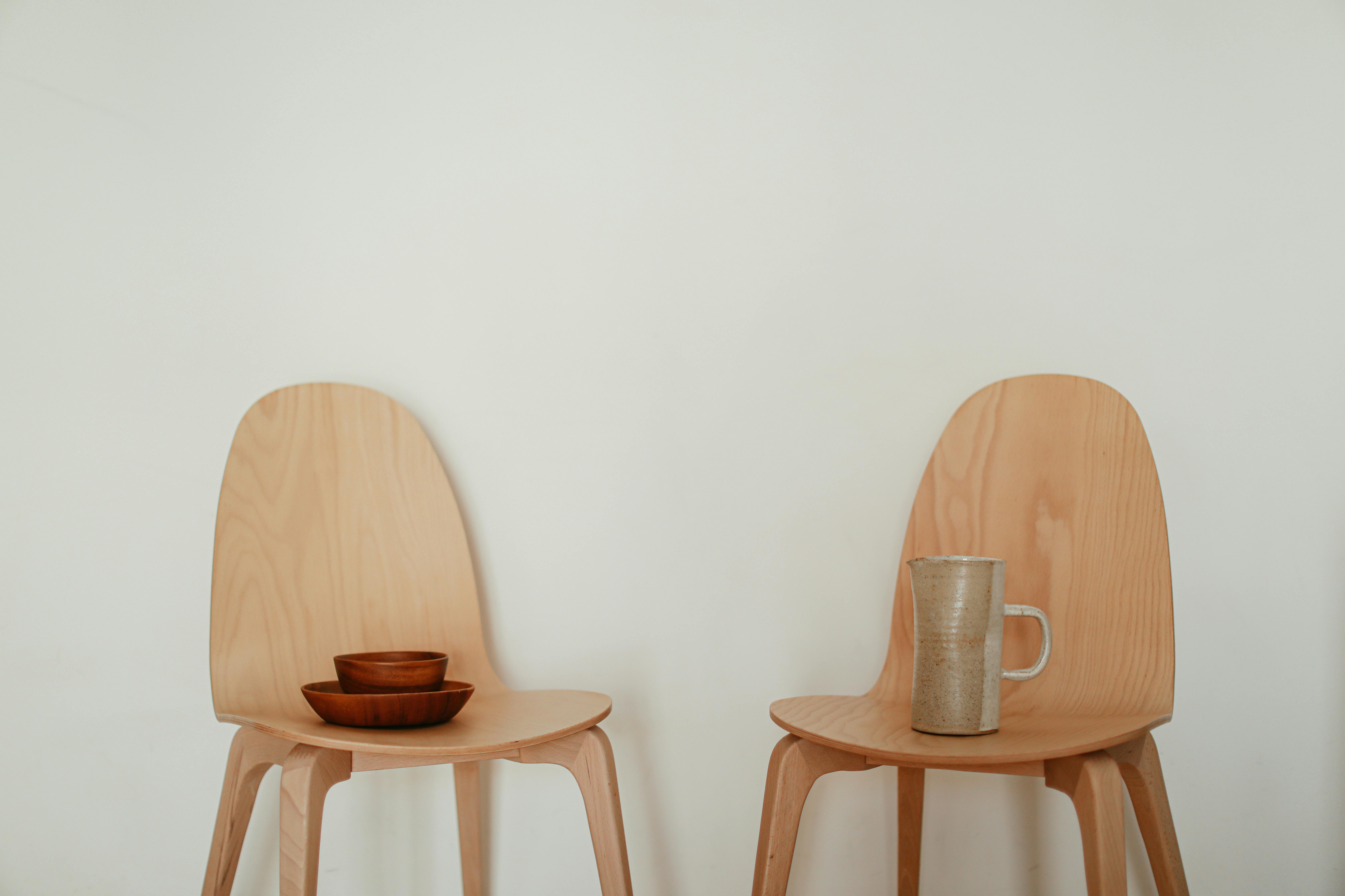 Wooden Bowls and a Pitcher on Wooden Chairs · Free Stock Photo