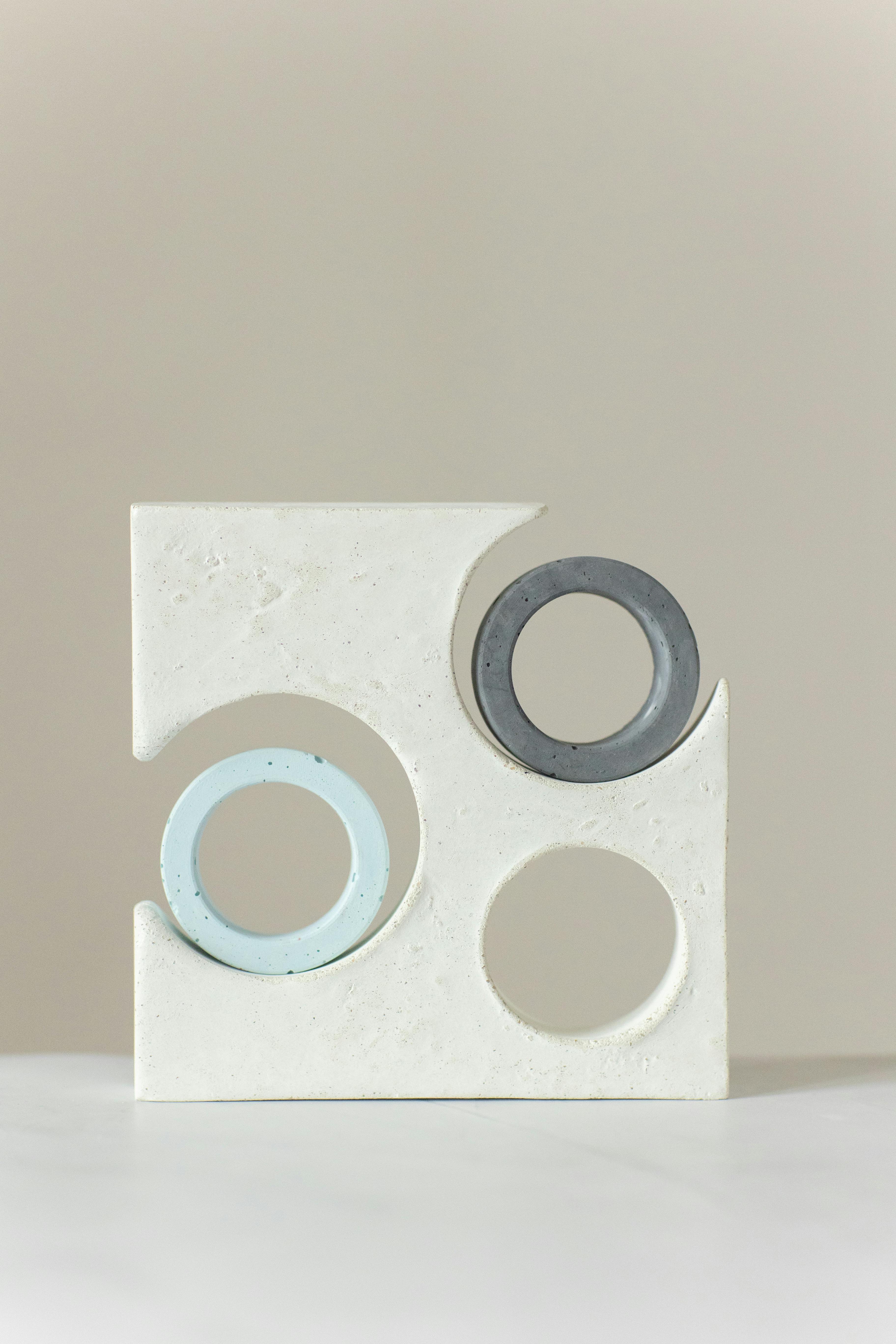 Photo of a Beige Ring on a White Surface · Free Stock Photo