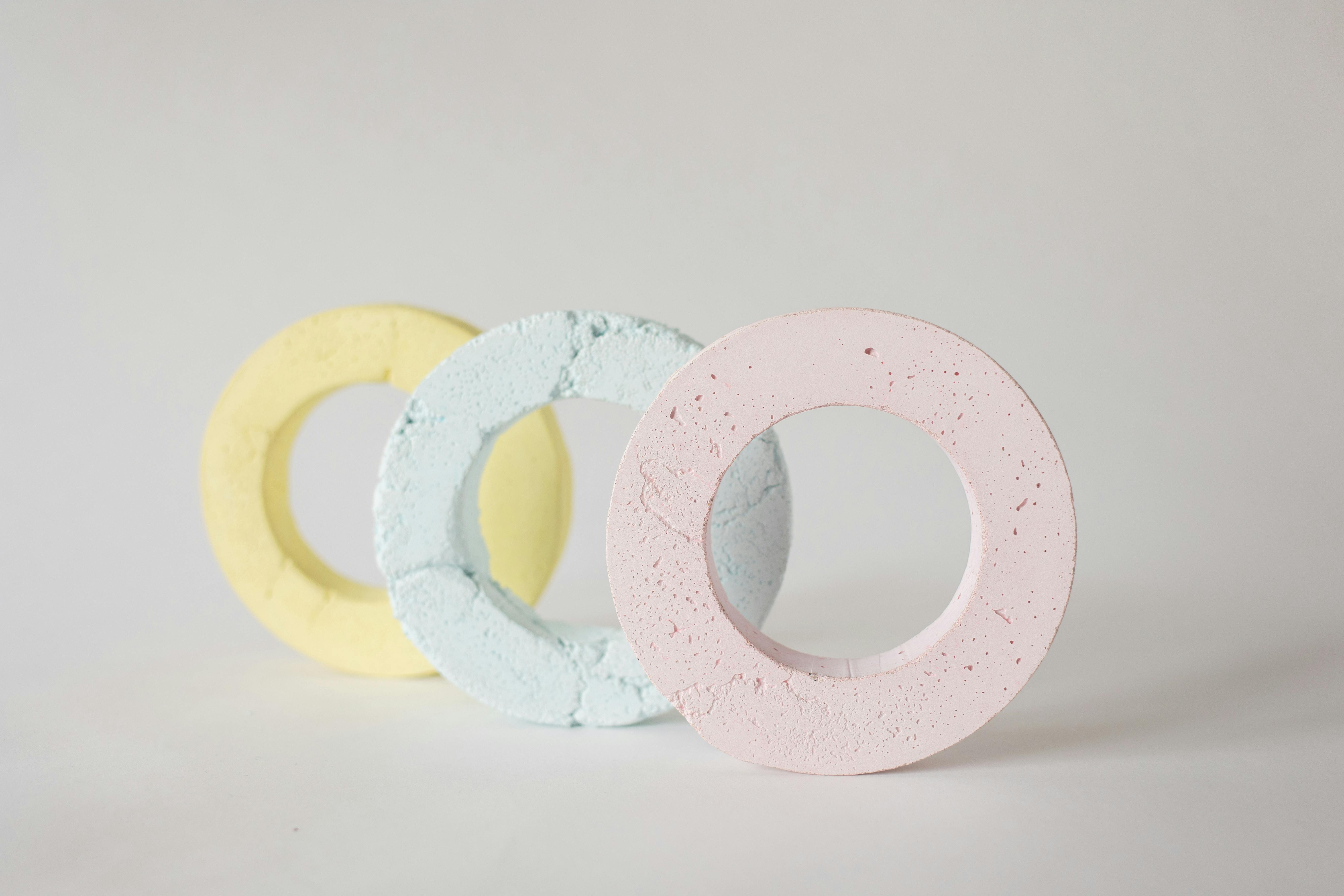 Photo of a Beige Ring on a White Surface · Free Stock Photo