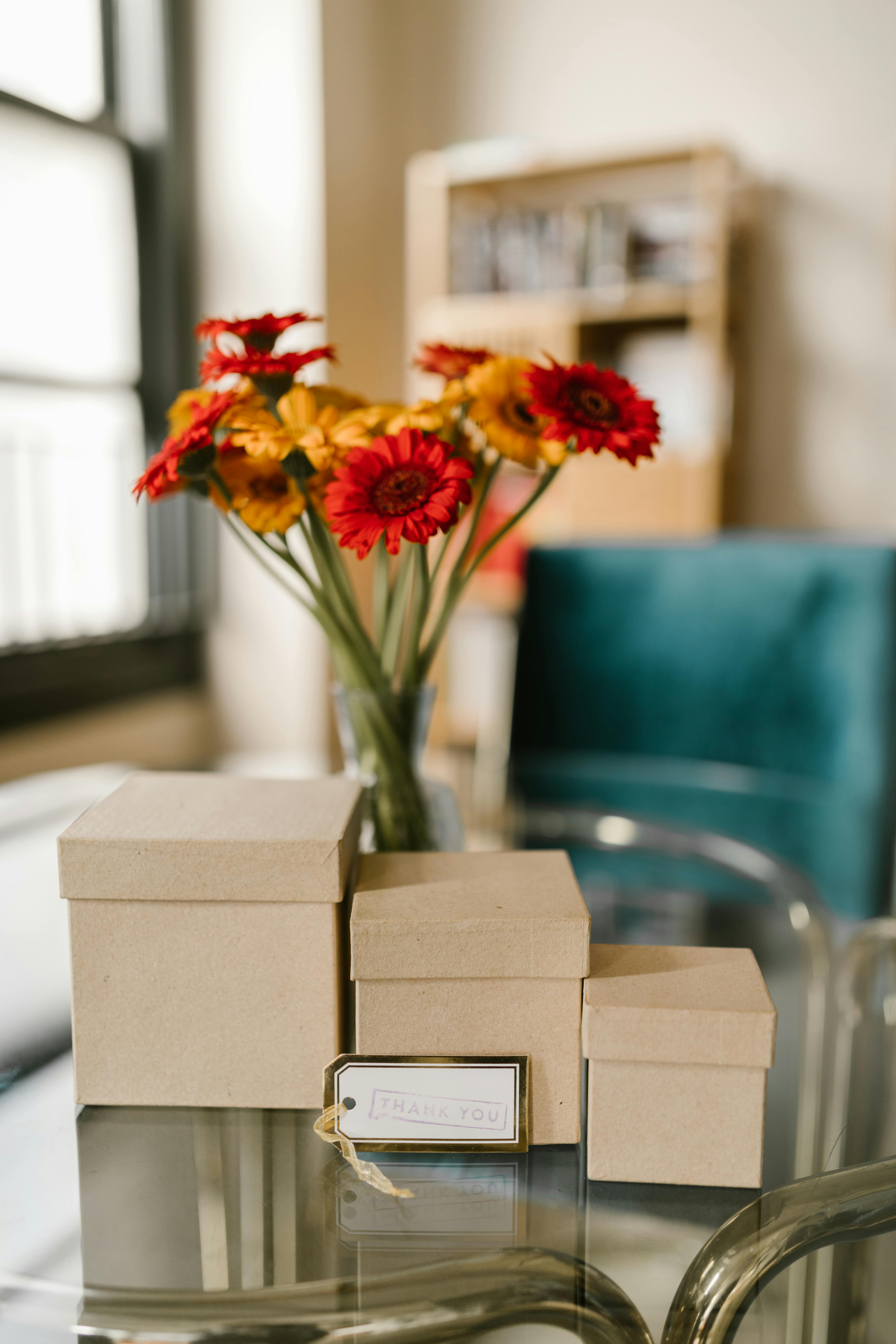 Brown Boxes with Lids on a Table · Free Stock Photo