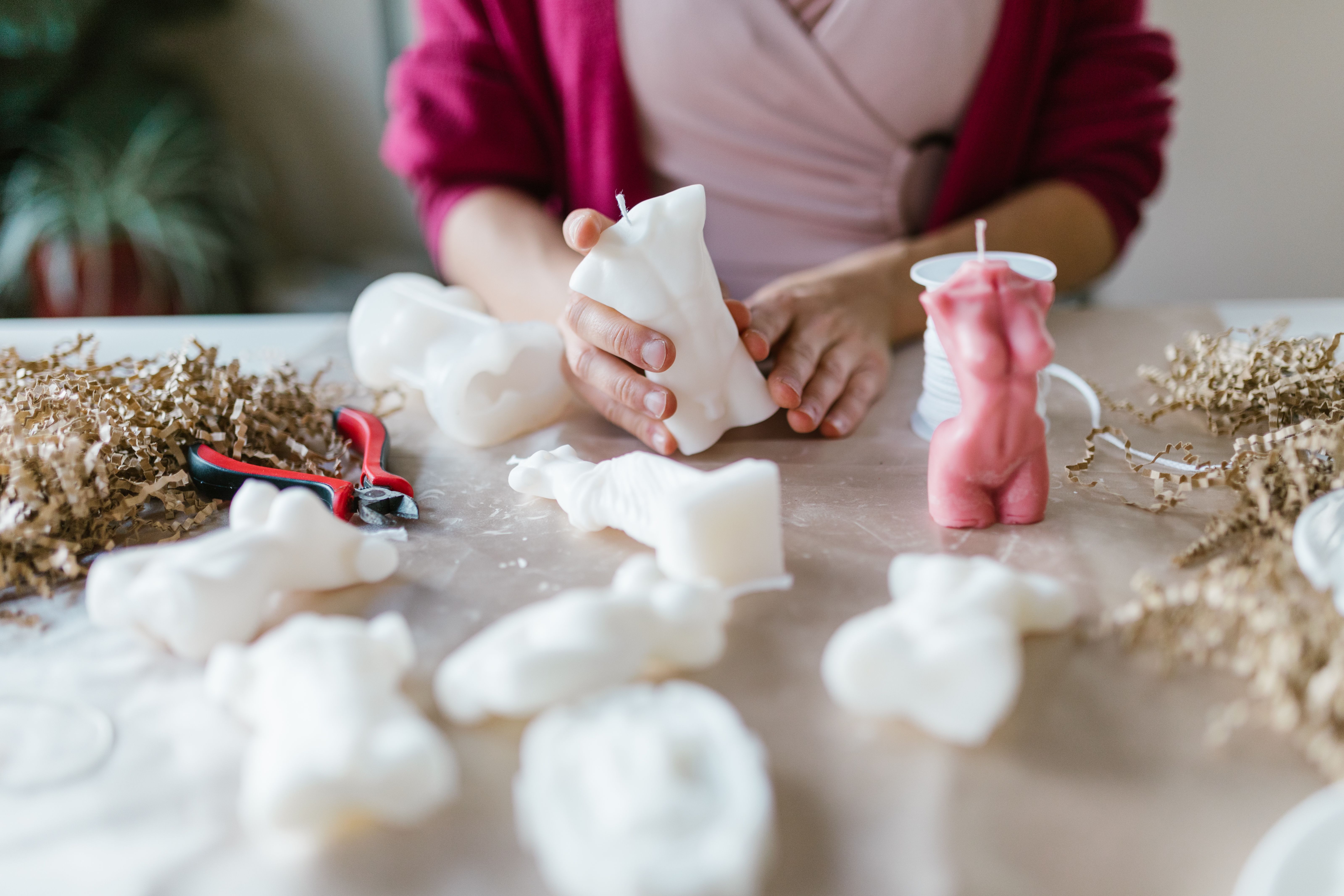 Person Holding a Body Shape Candle · Free Stock Photo