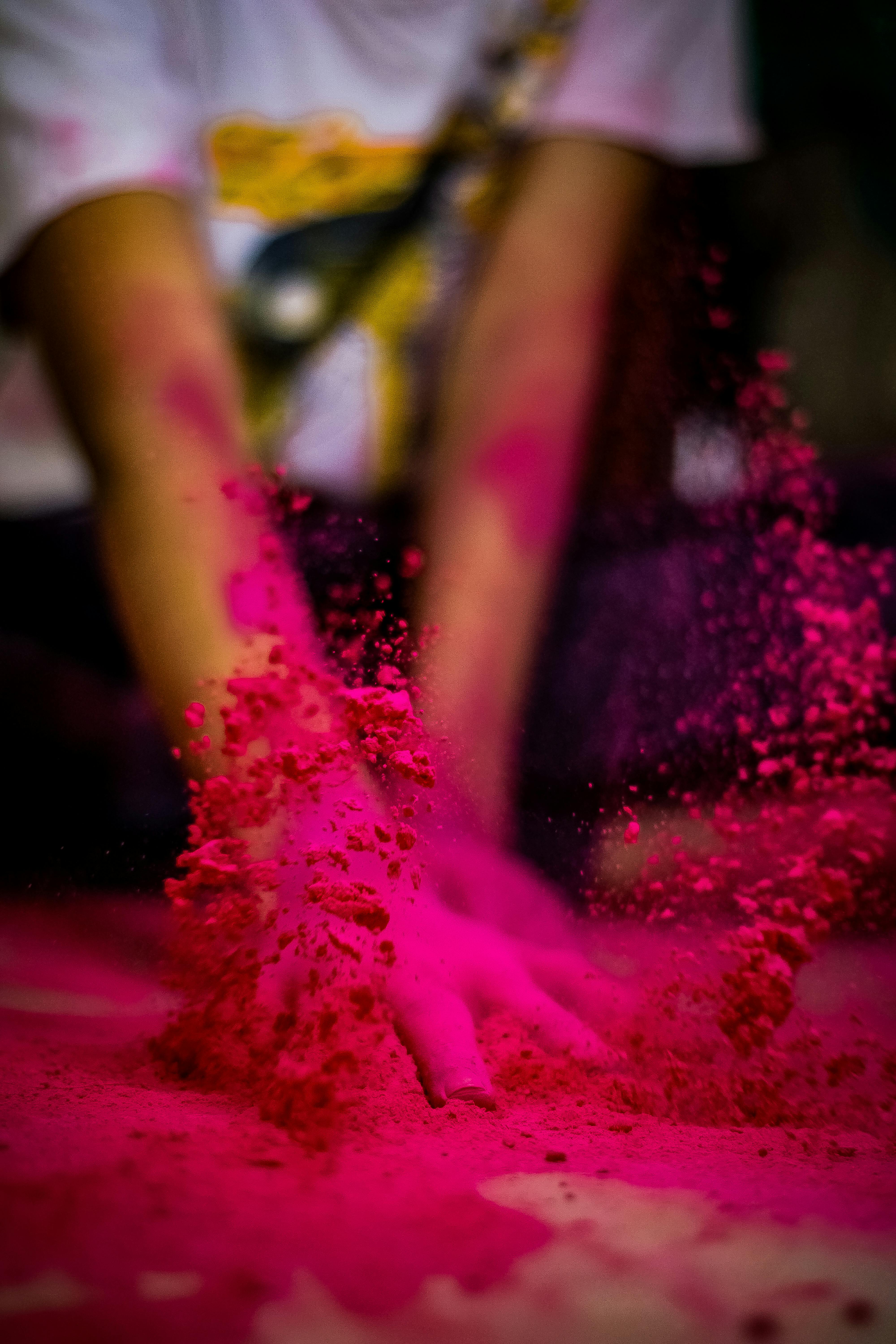 A Person Playing Pink Holi Powder · Free Stock Photo