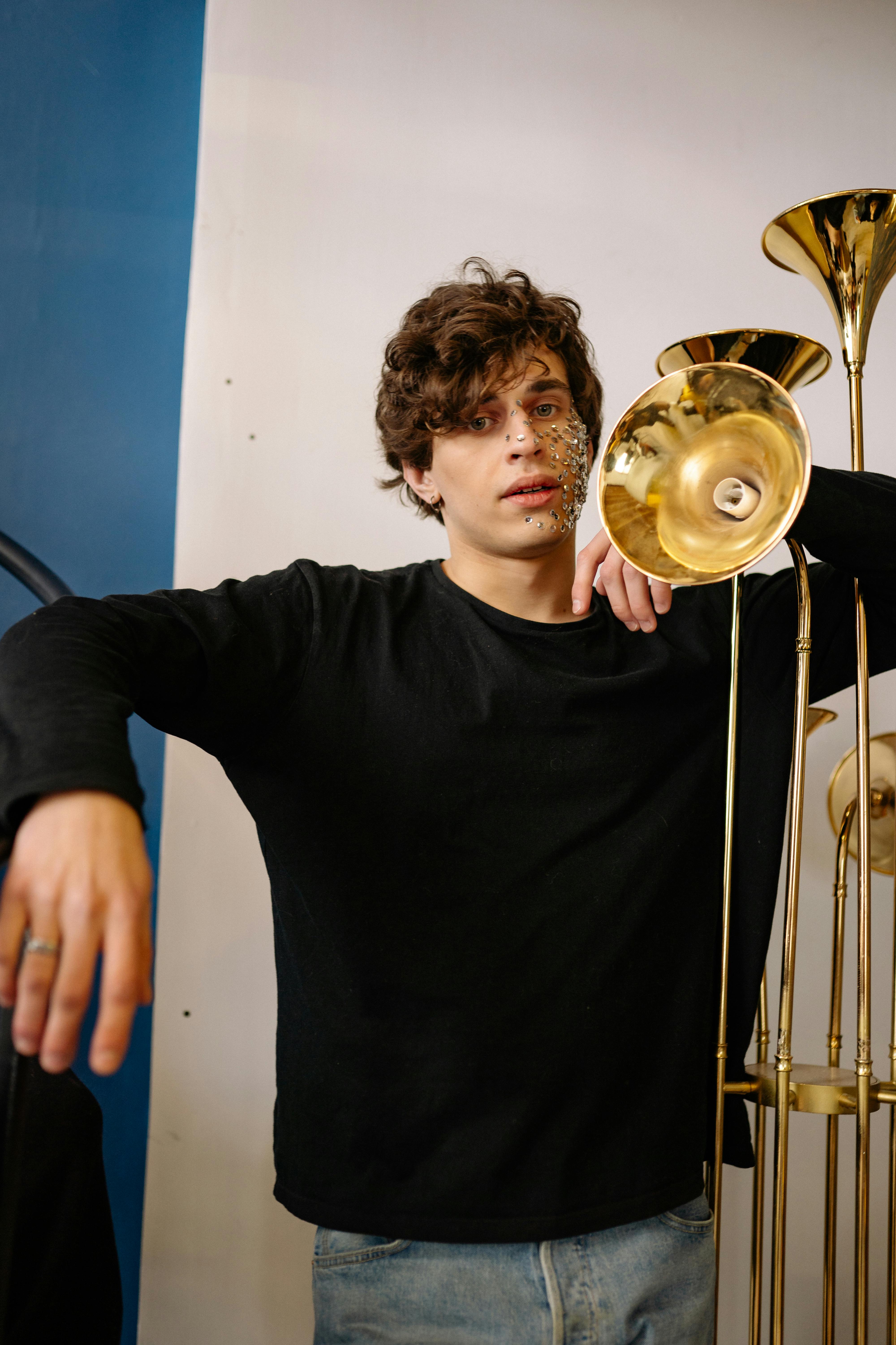 A Man with Sequins on His Face · Free Stock Photo