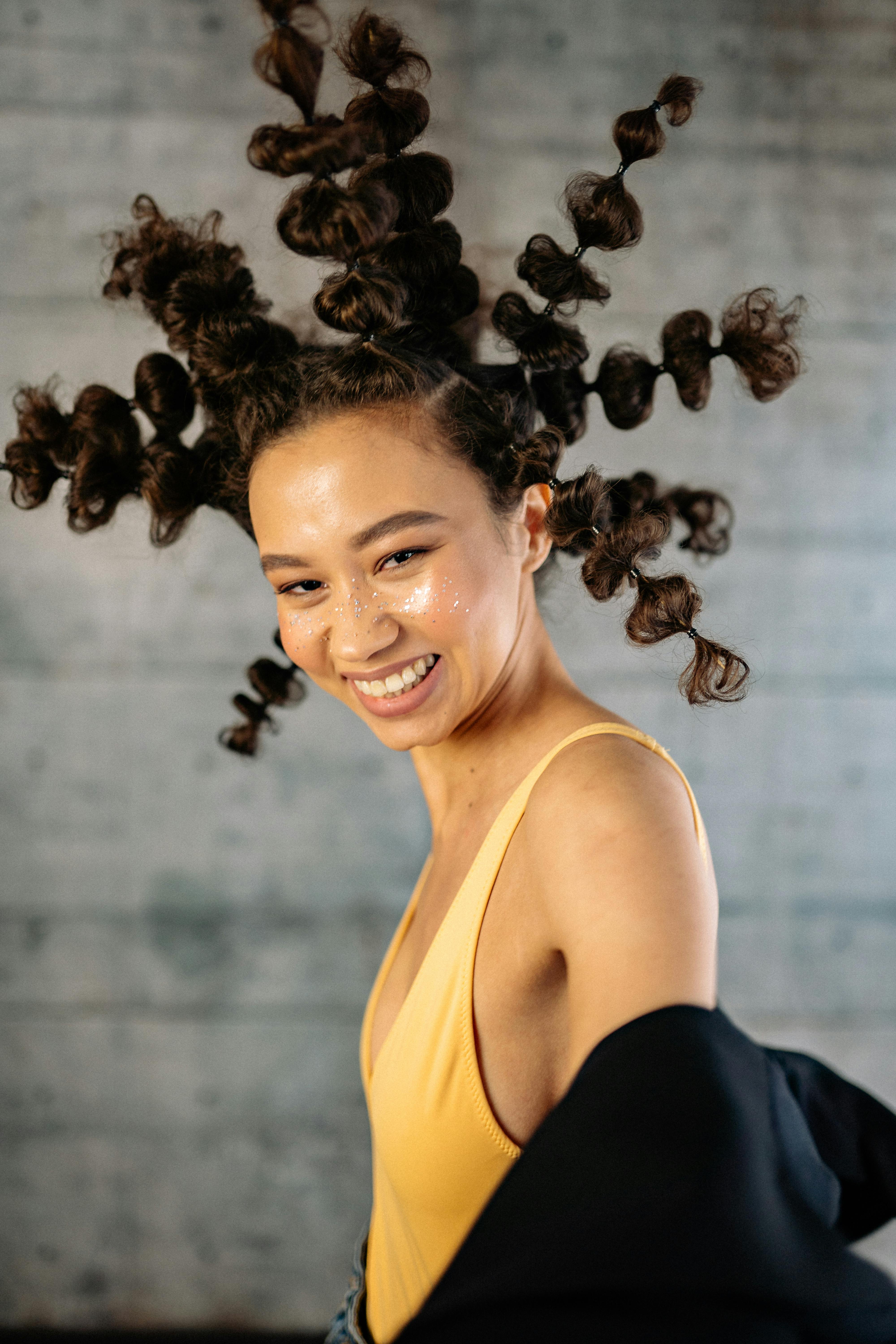 Woman with a Creative Hairstyle · Free Stock Photo