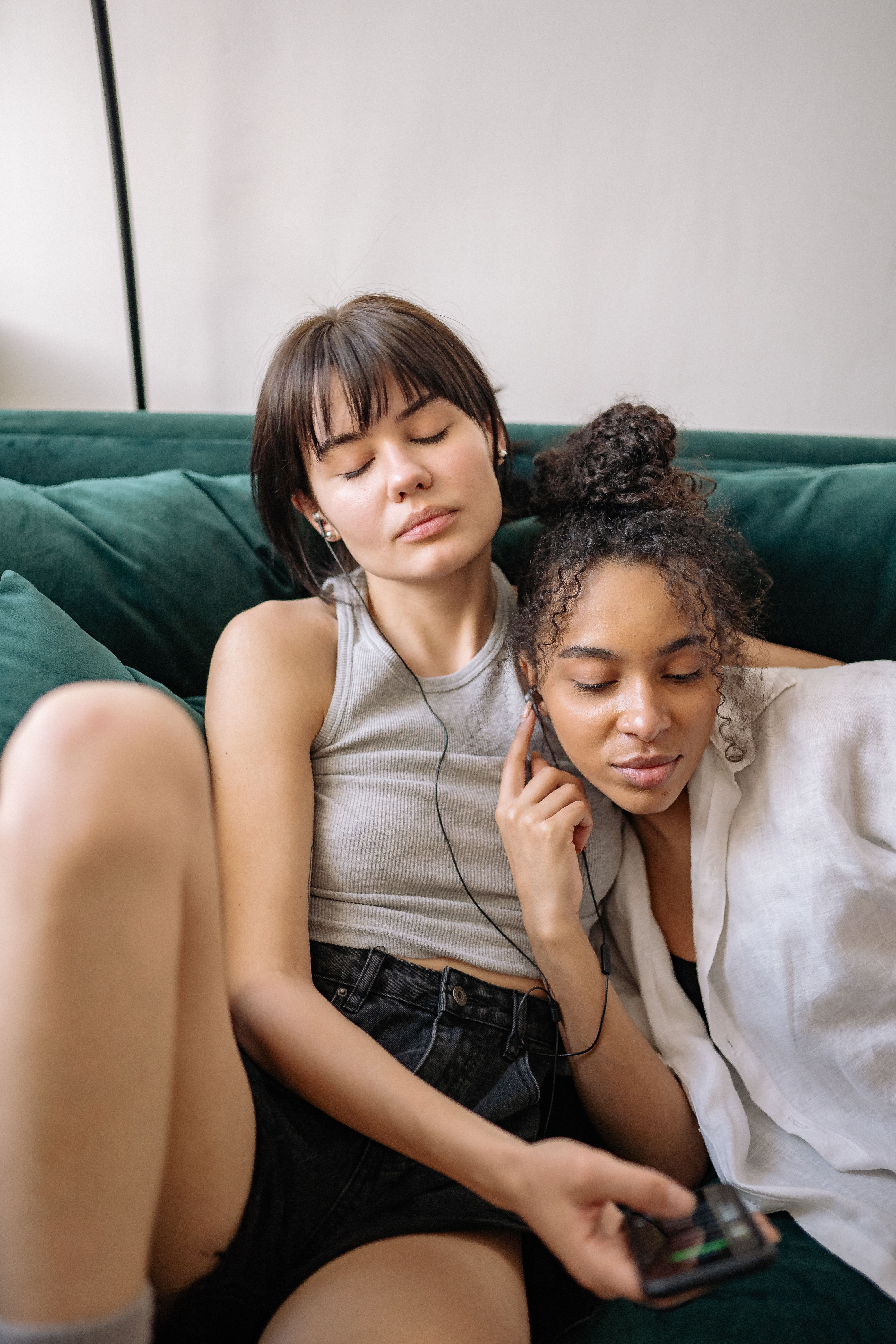 Women Sitting on the Couch · Free Stock Photo