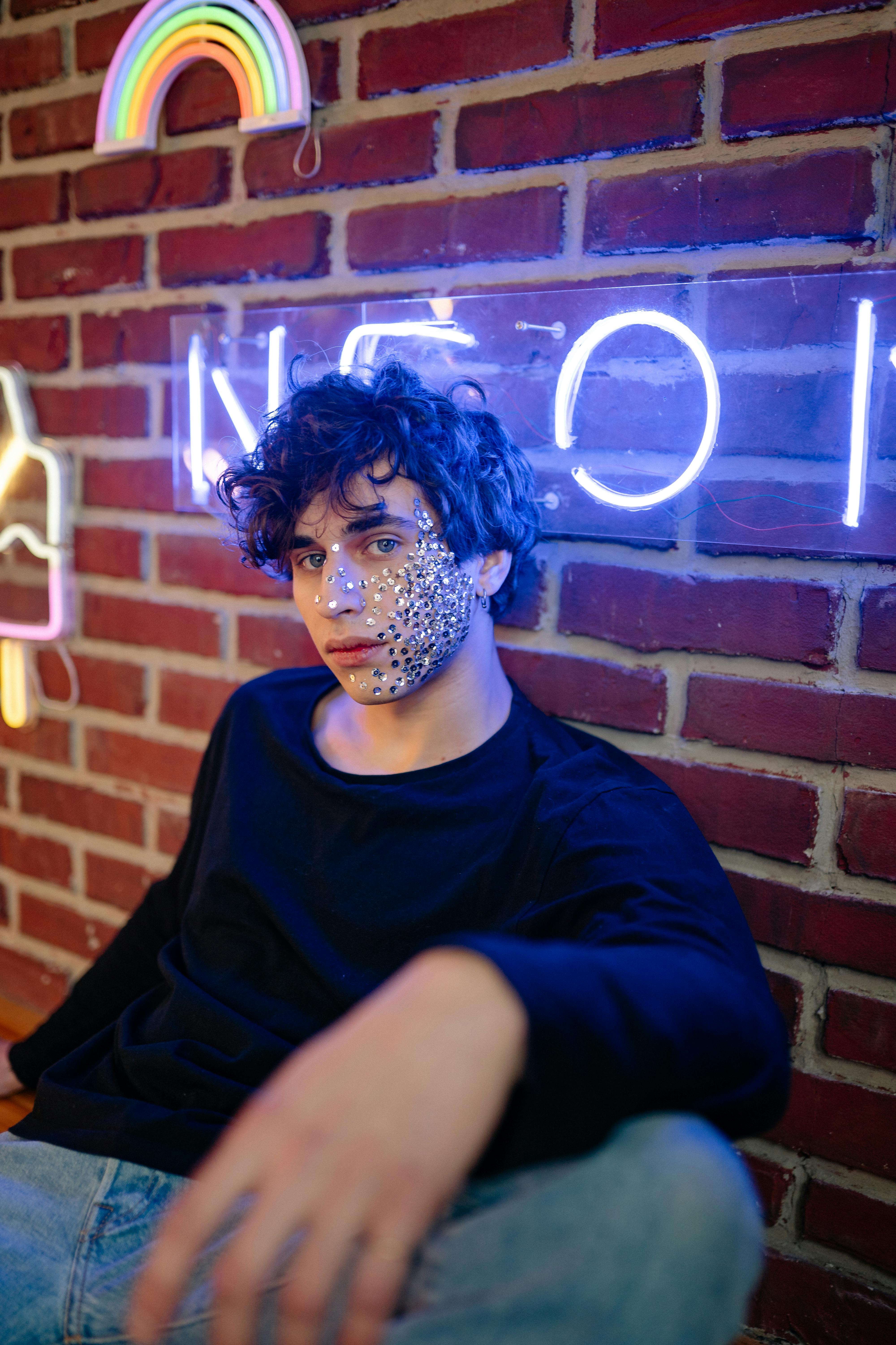 A Man with Sequins on His Face · Free Stock Photo