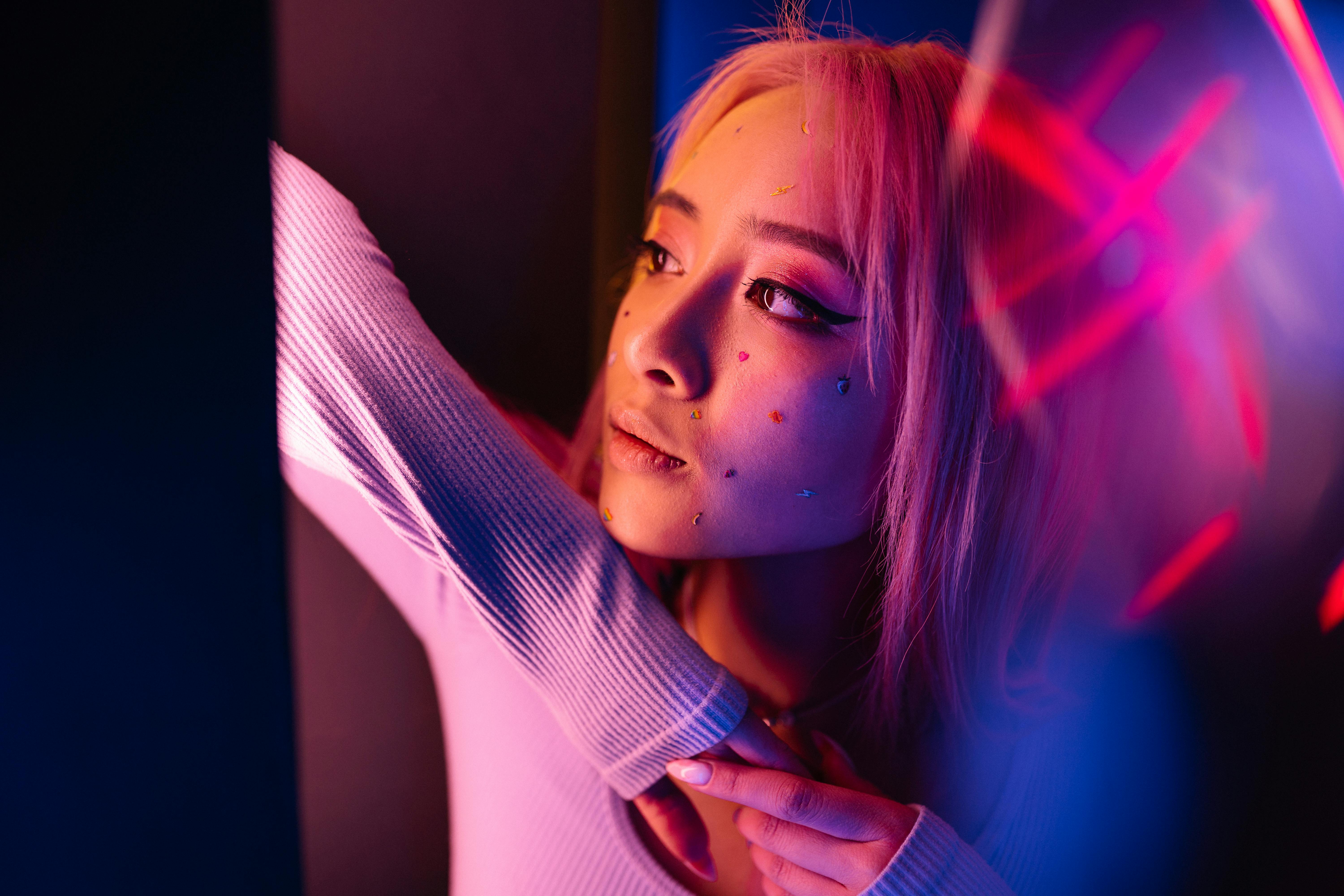 A Woman with Blue Dots on Face · Free Stock Photo