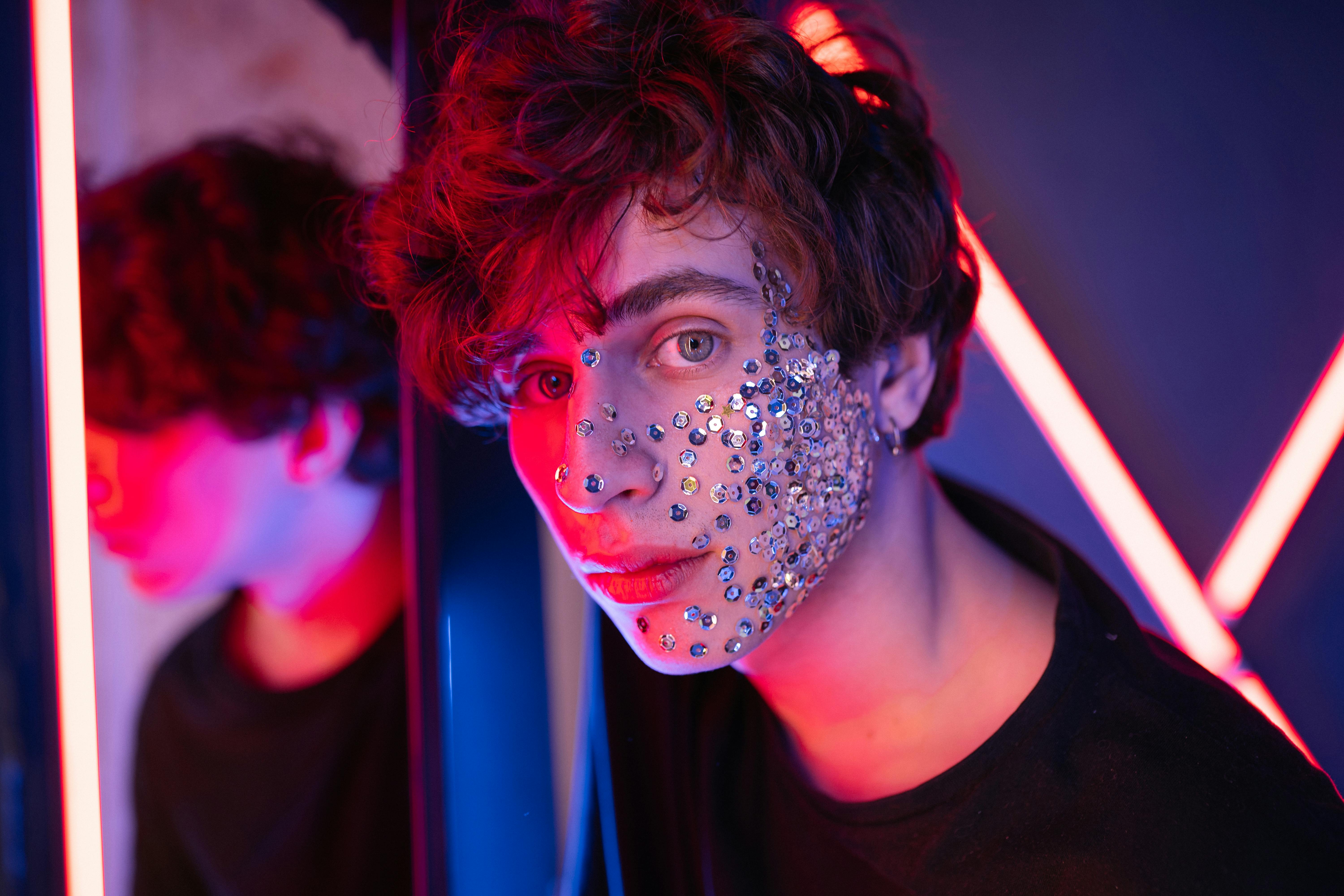 A Man with Sequins on His Face · Free Stock Photo