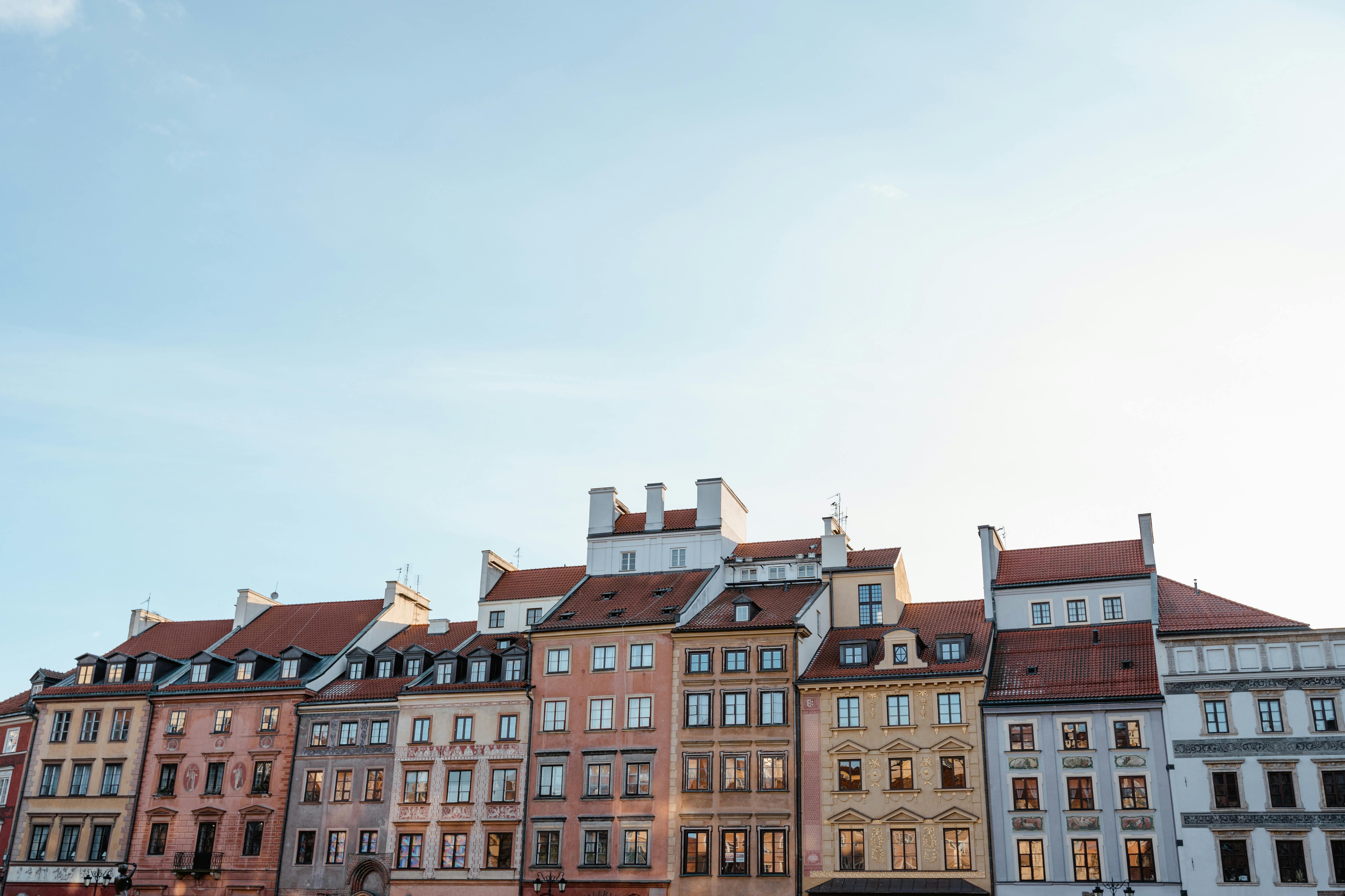 Brown and Beige Concrete Building Under Blue Sky · Free Stock Photo