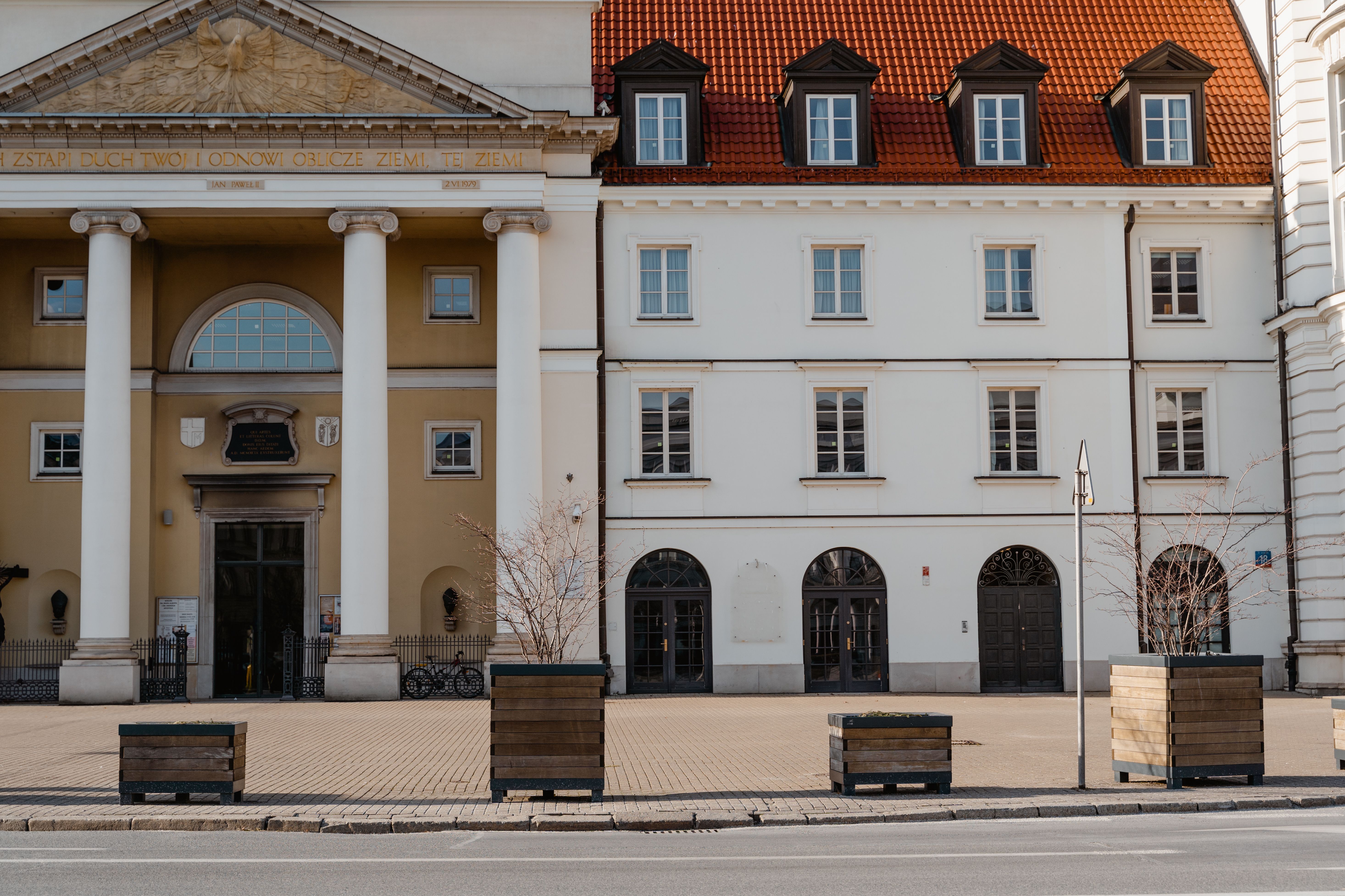 Two Buildings With Different Architectural Designs · Free Stock Photo