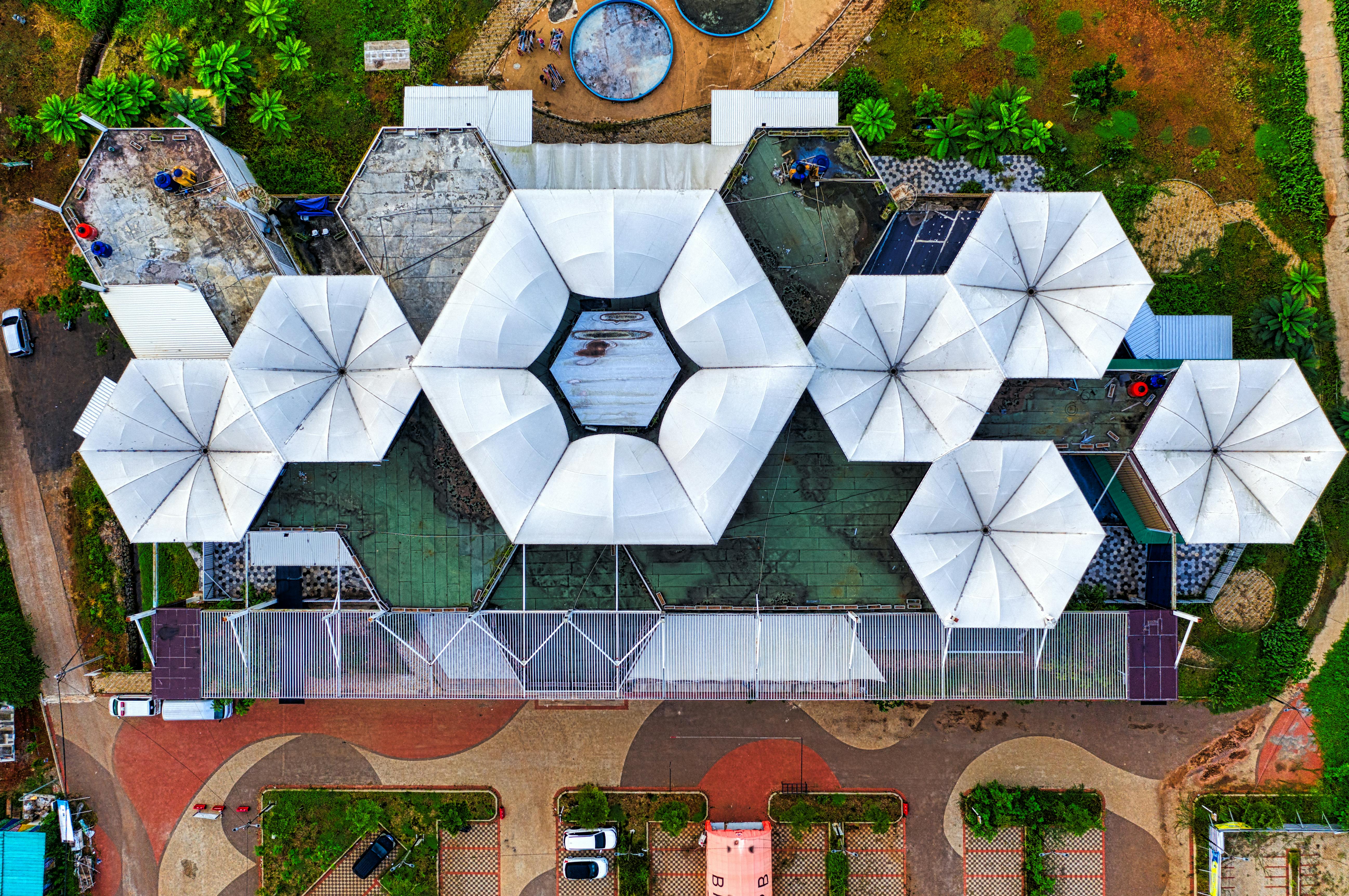 Aerial View of Hexagonal Roofs of Buildings · Free Stock Photo