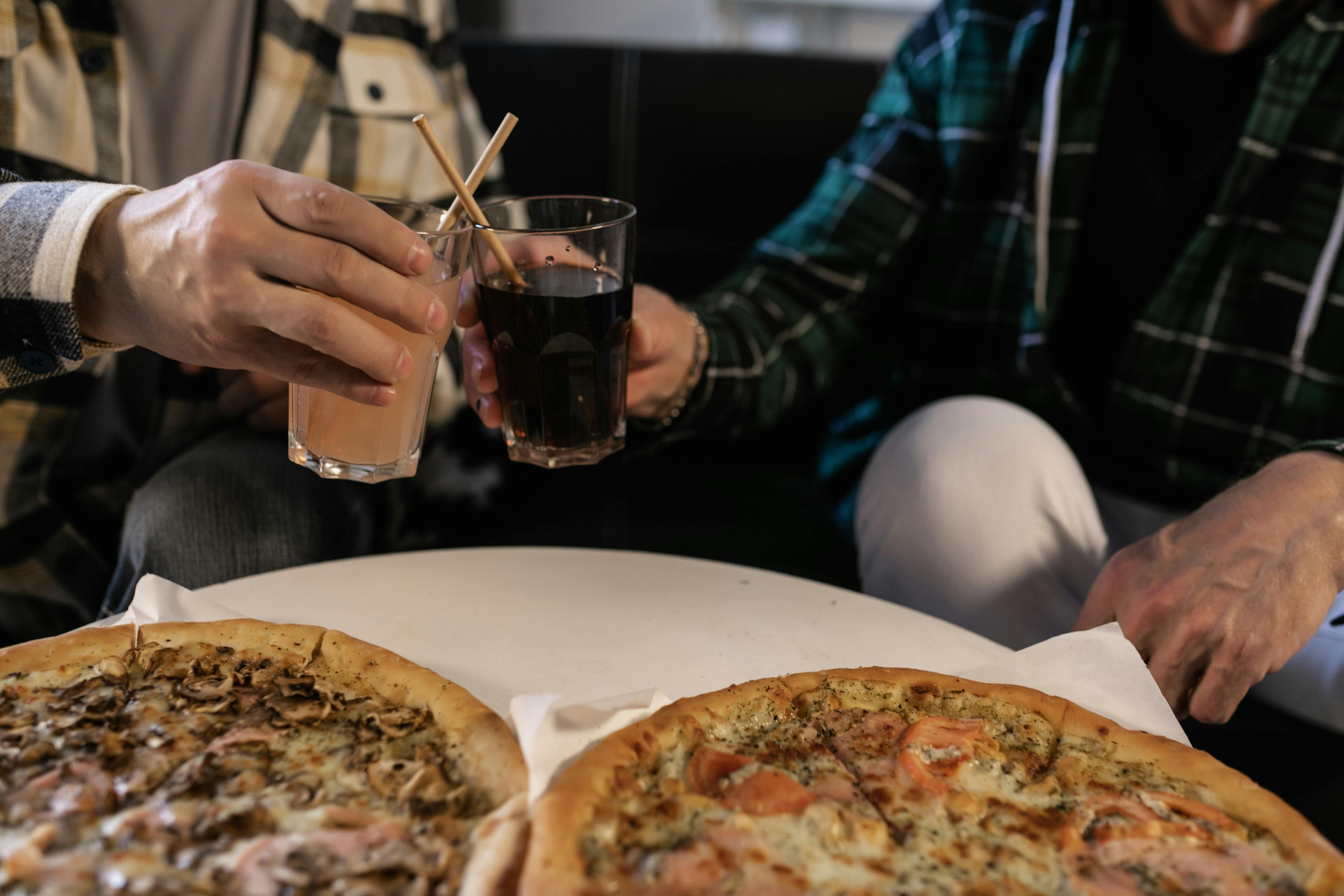 Elderly Men Eating while Talking to Each Other · Free Stock Photo