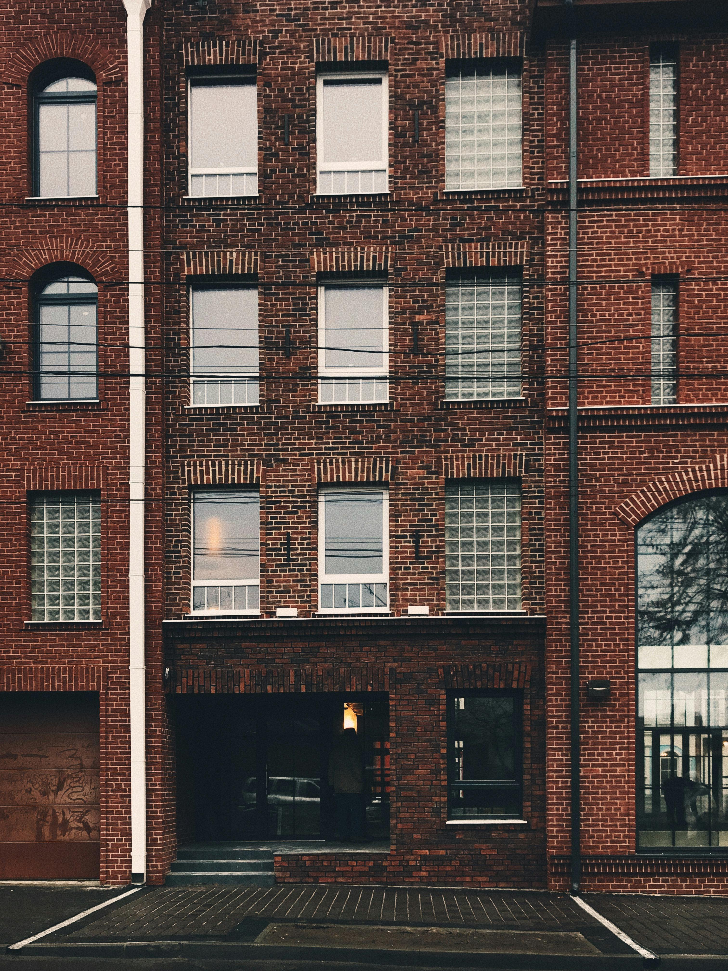 Brown Building with Glass Windows · Free Stock Photo