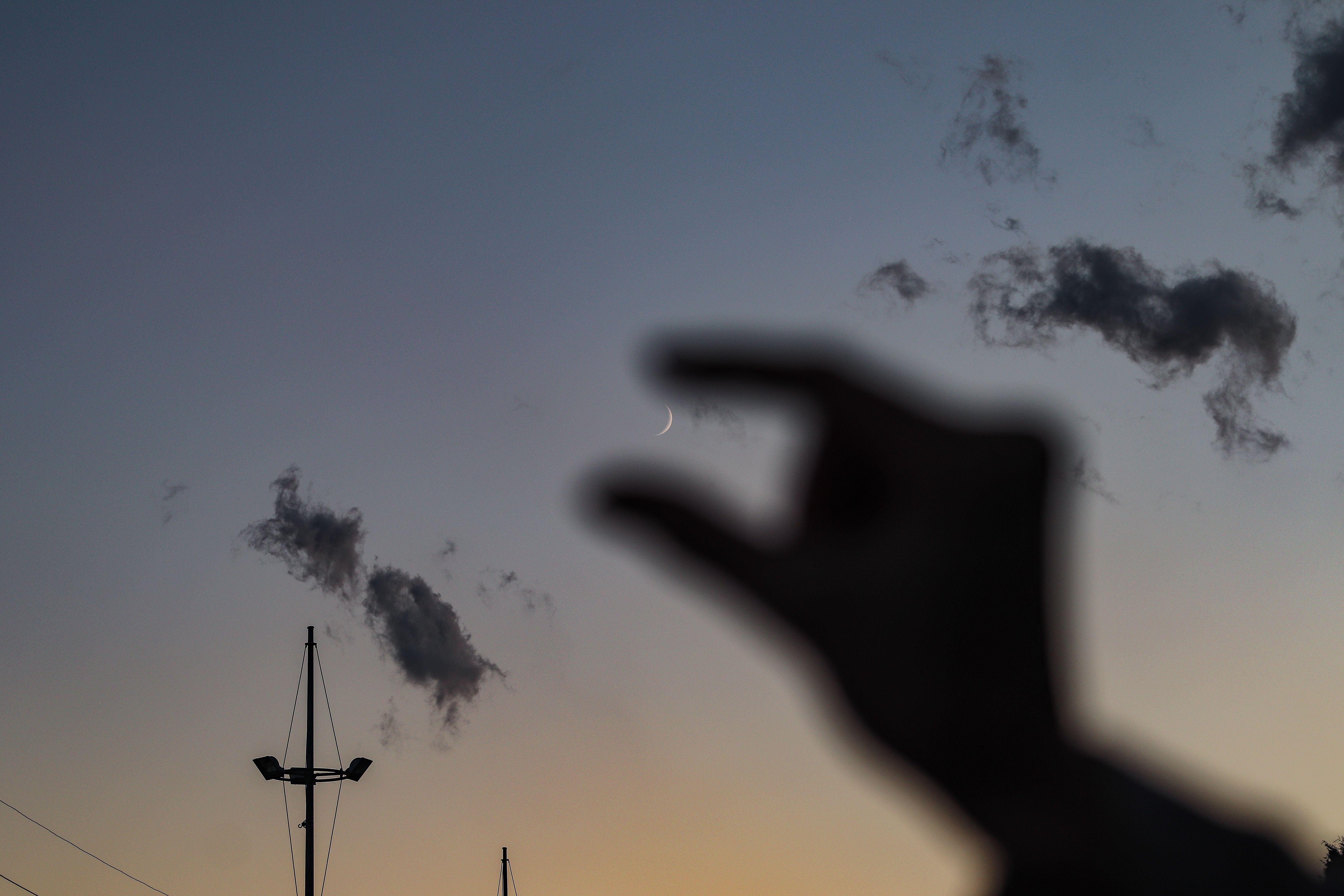 Silhouette of Fingers Holing the Moon · Free Stock Photo