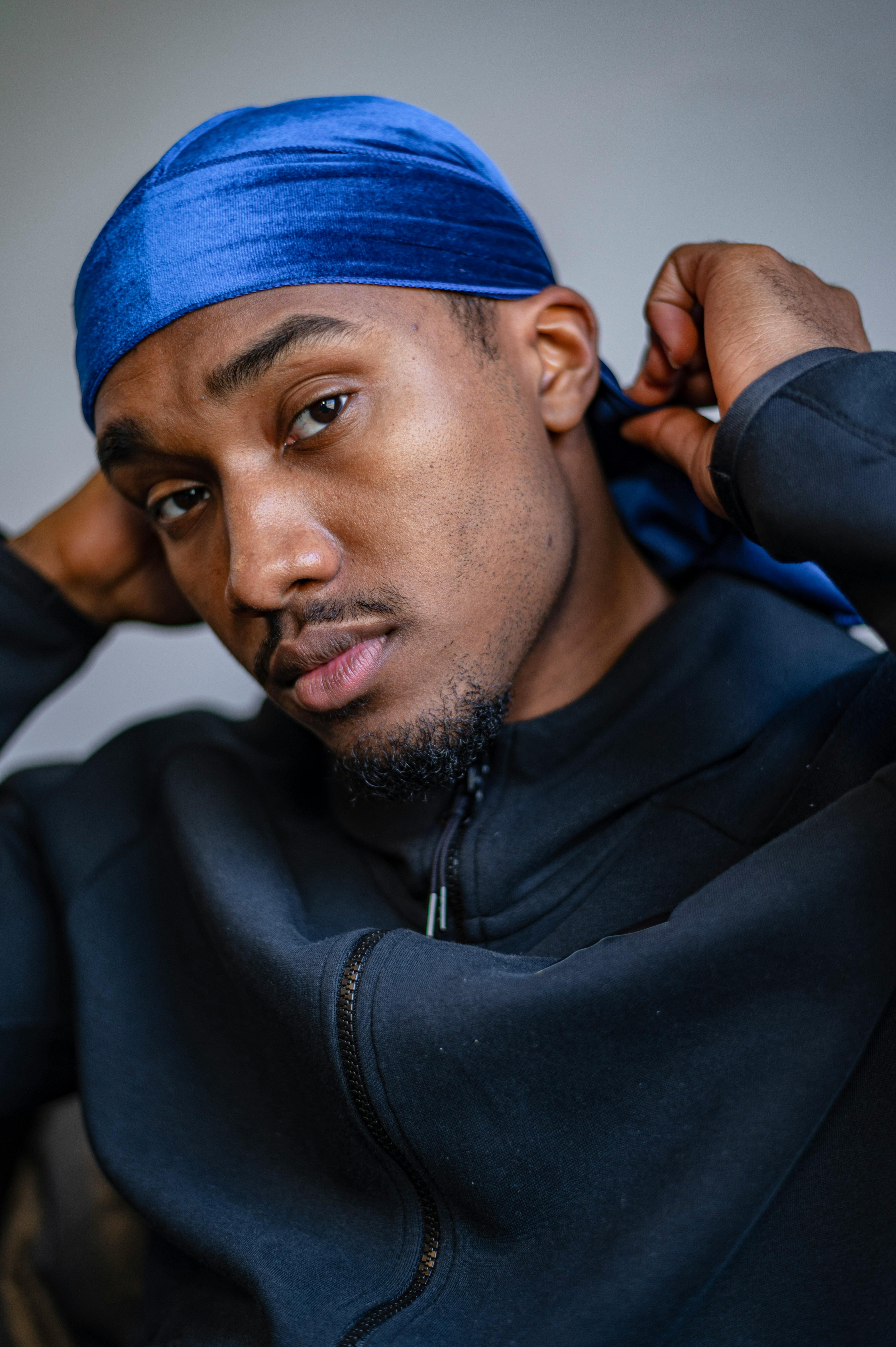 Portrait of a Man Wearing a Blue Durag · Free Stock Photo
