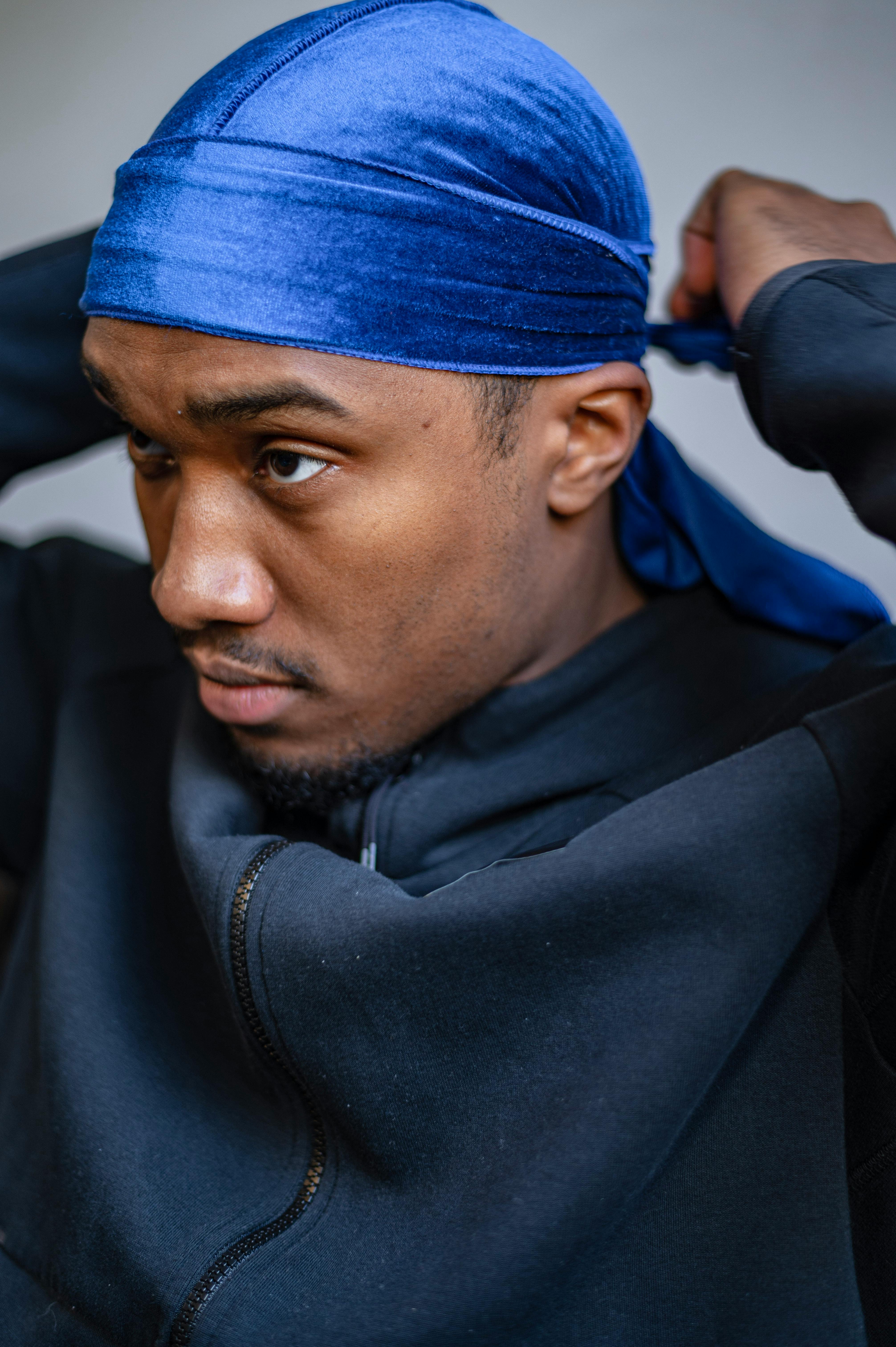 A Man Wearing a Blue Durag · Free Stock Photo