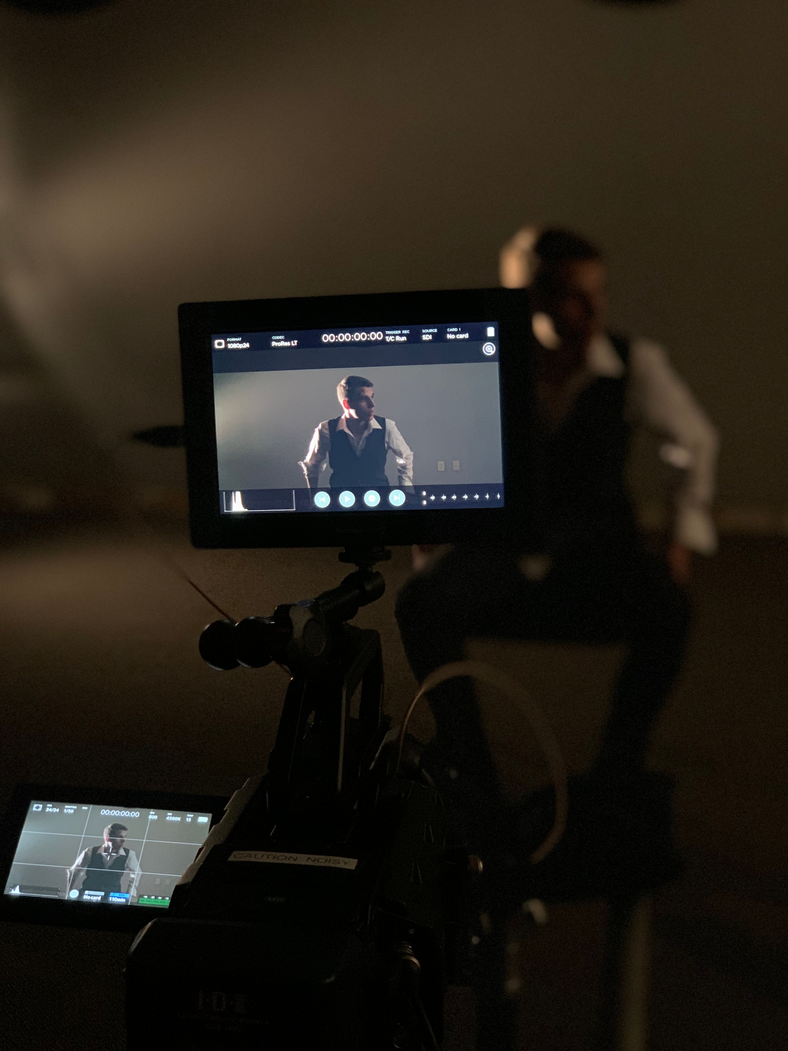 Camera Recording Well Dressed Man in Studio · Free Stock Photo