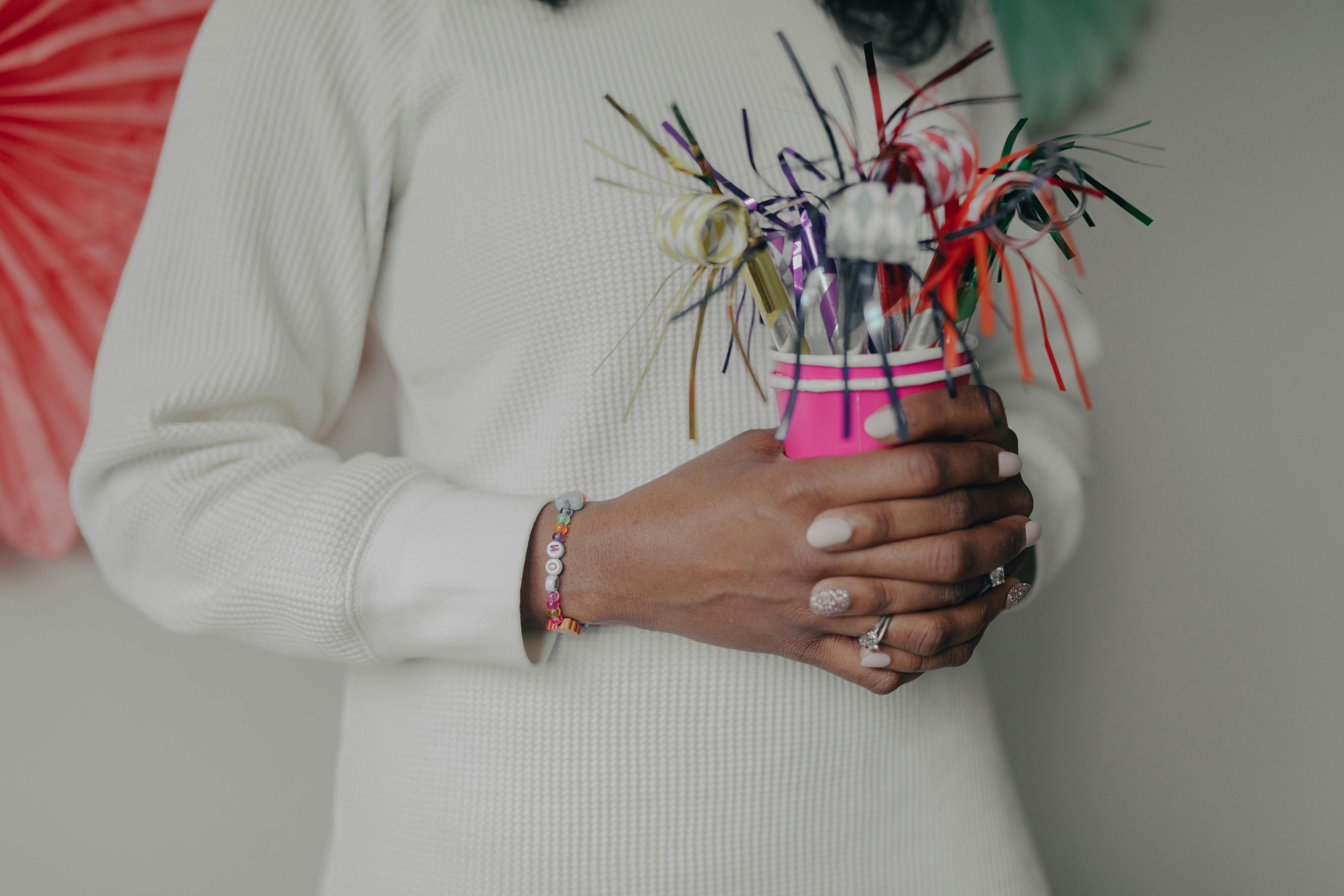 A Person Holding a Cupping Glass · Free Stock Photo
