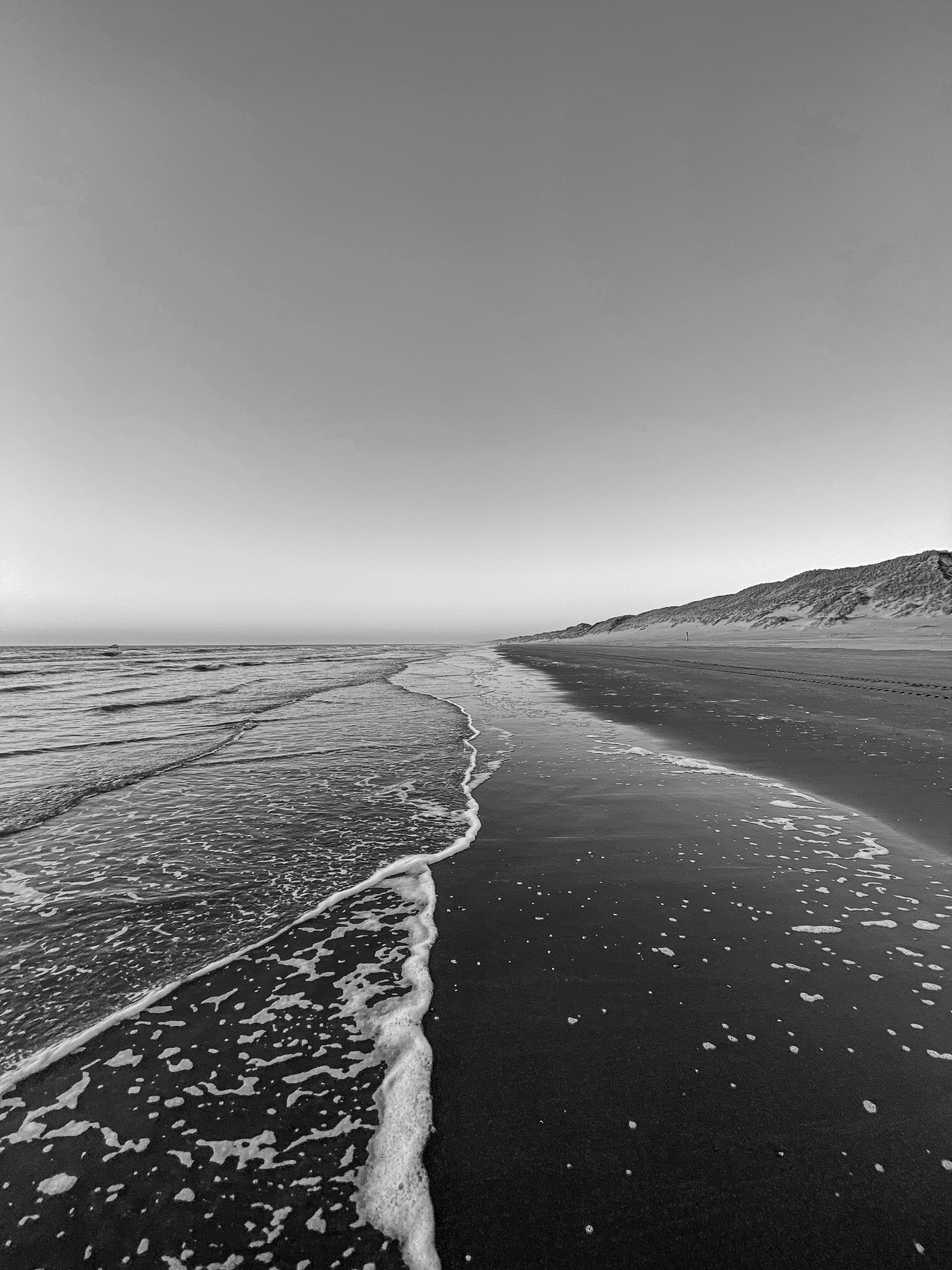 Grayscale Photo of Ocean Waves · Free Stock Photo