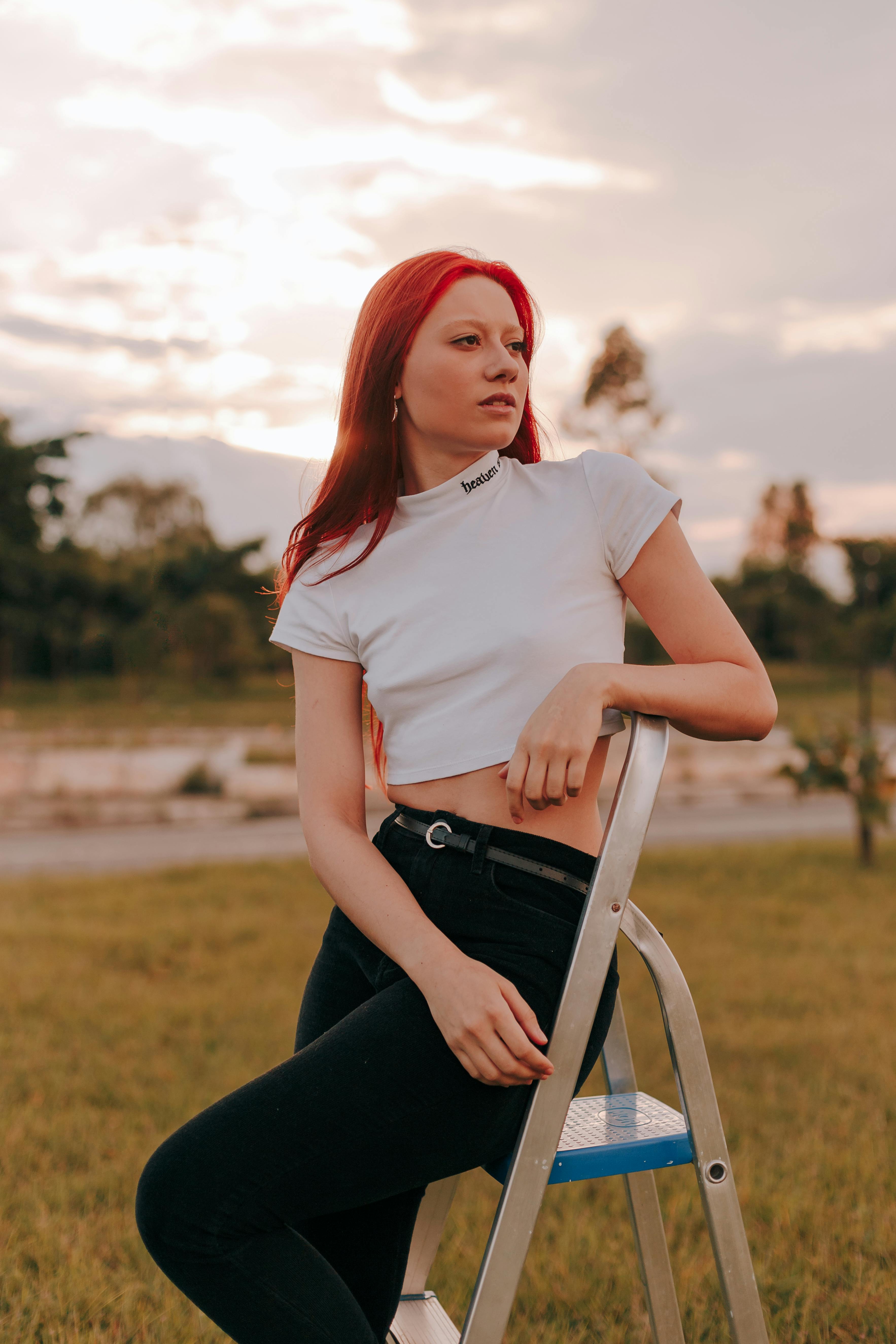 A Woman on a Ladder · Free Stock Photo