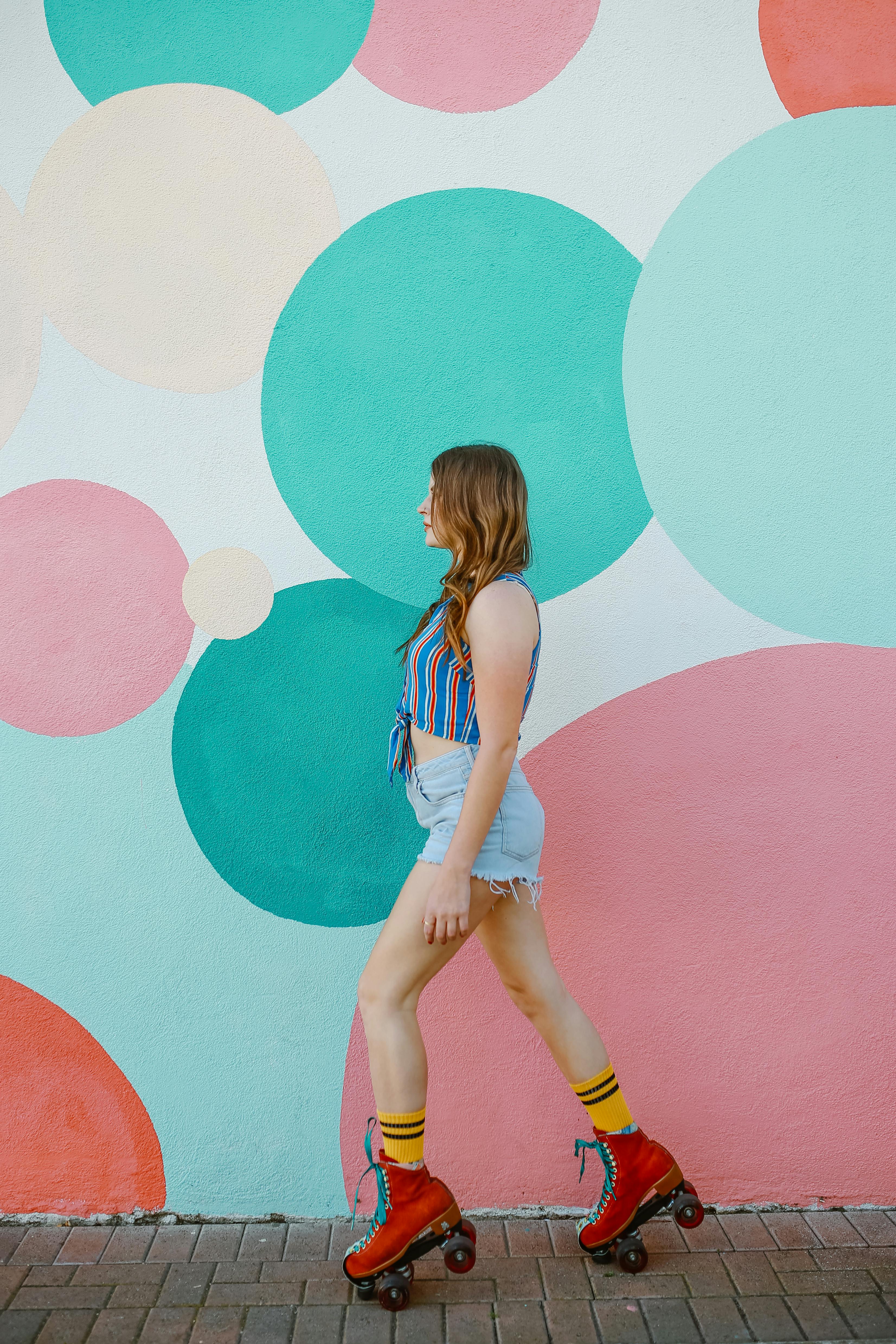 Selective Focus Photo of Two Women in Roller Skates Leaning on a ...