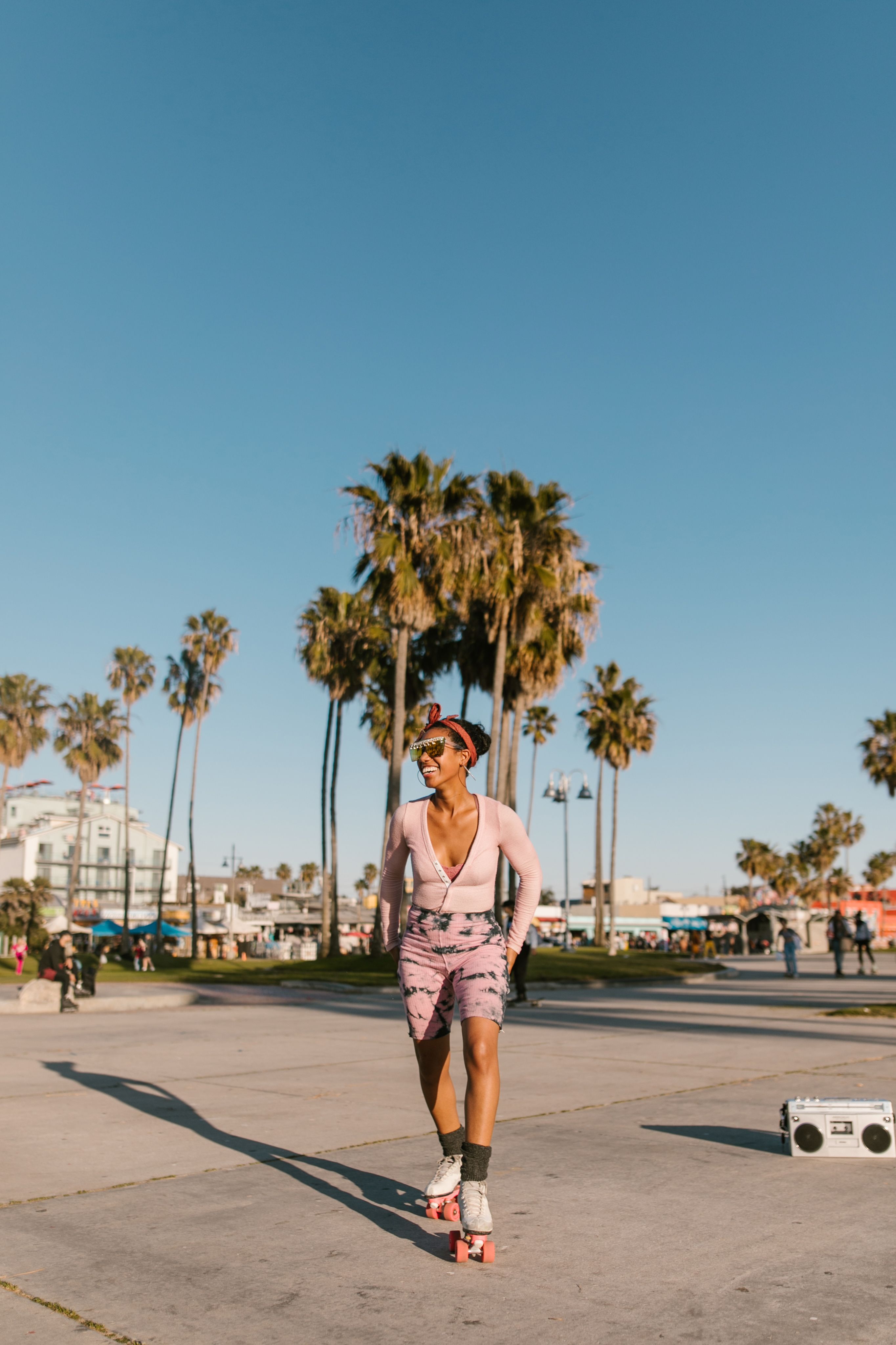 Woman Roller Skating Near Colorful Street Art · Free Stock Photo