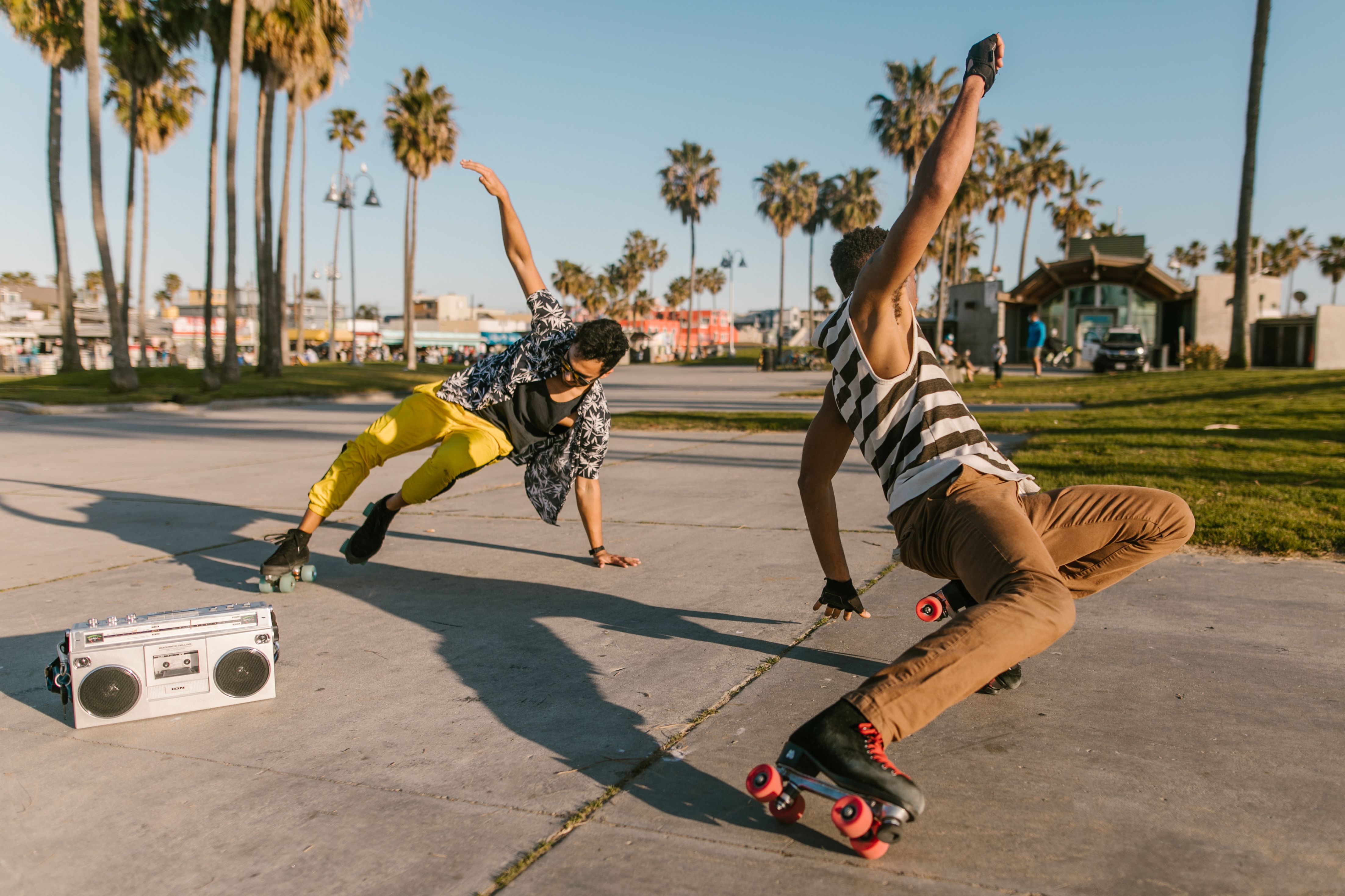 Men Roller Skating in a Park · Free Stock Photo