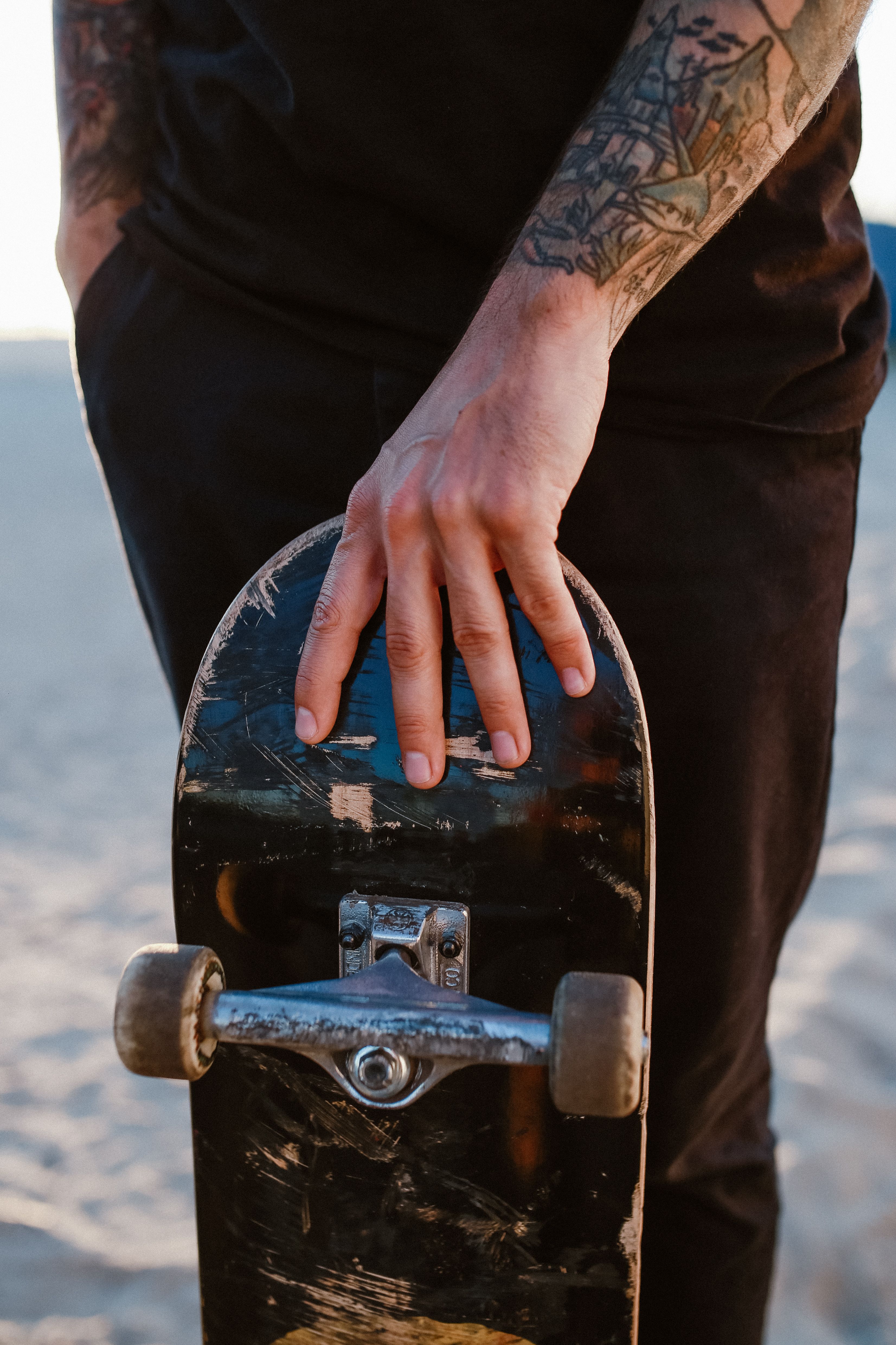 Person Holding a Skateboard · Free Stock Photo