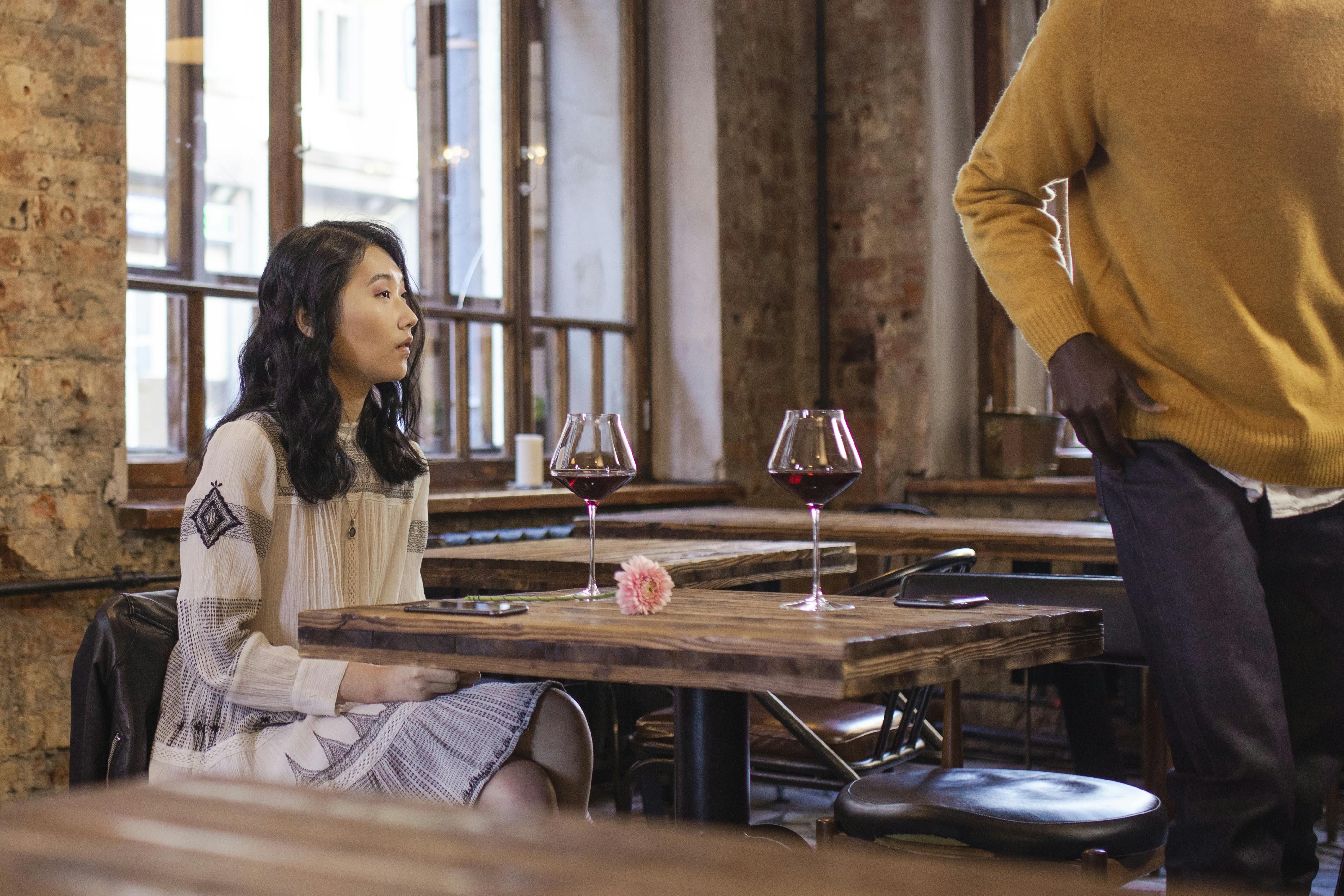 Woman Sitting at the Table · Free Stock Photo