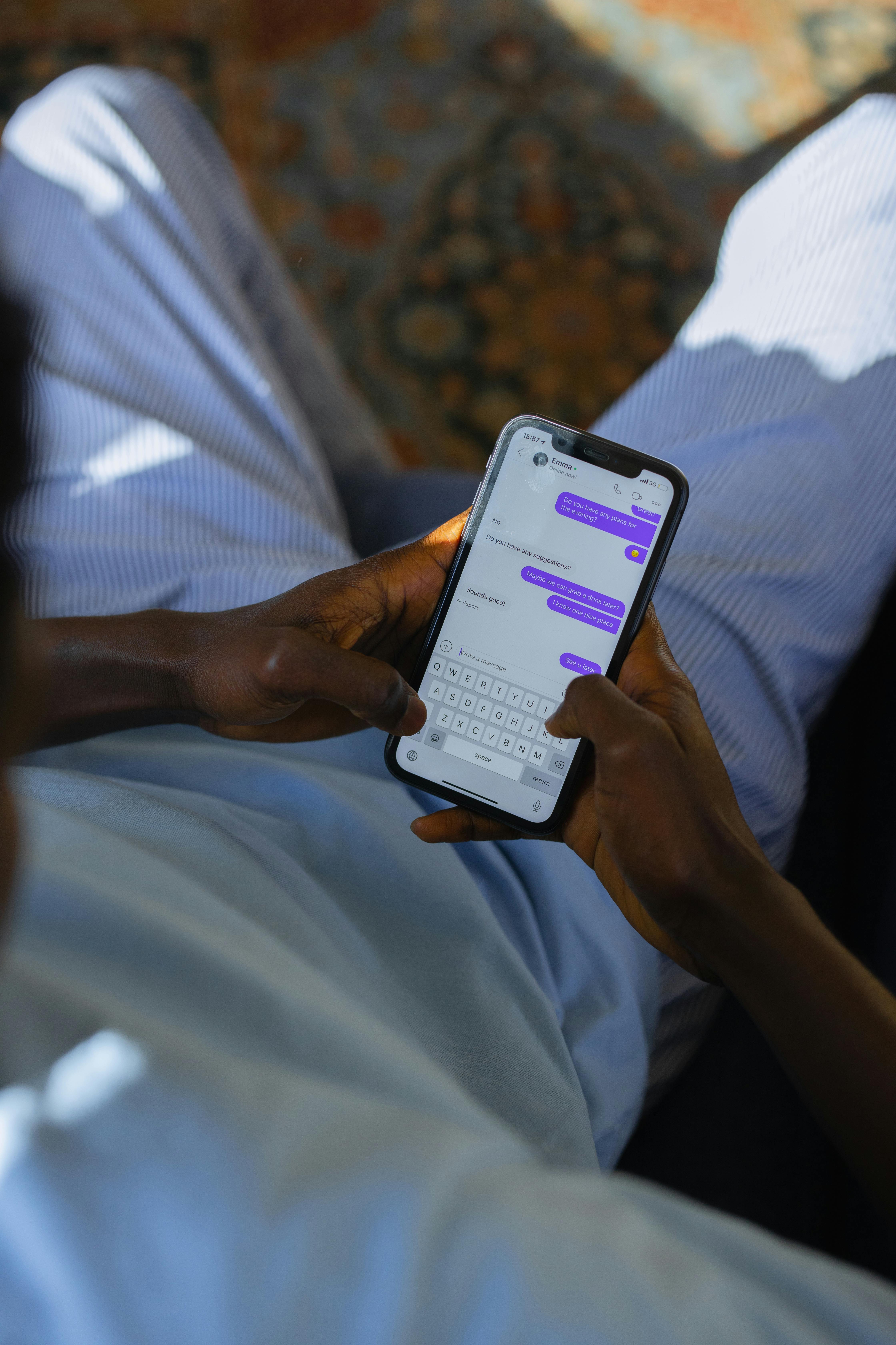 Person Typing Message on Phone · Free Stock Photo