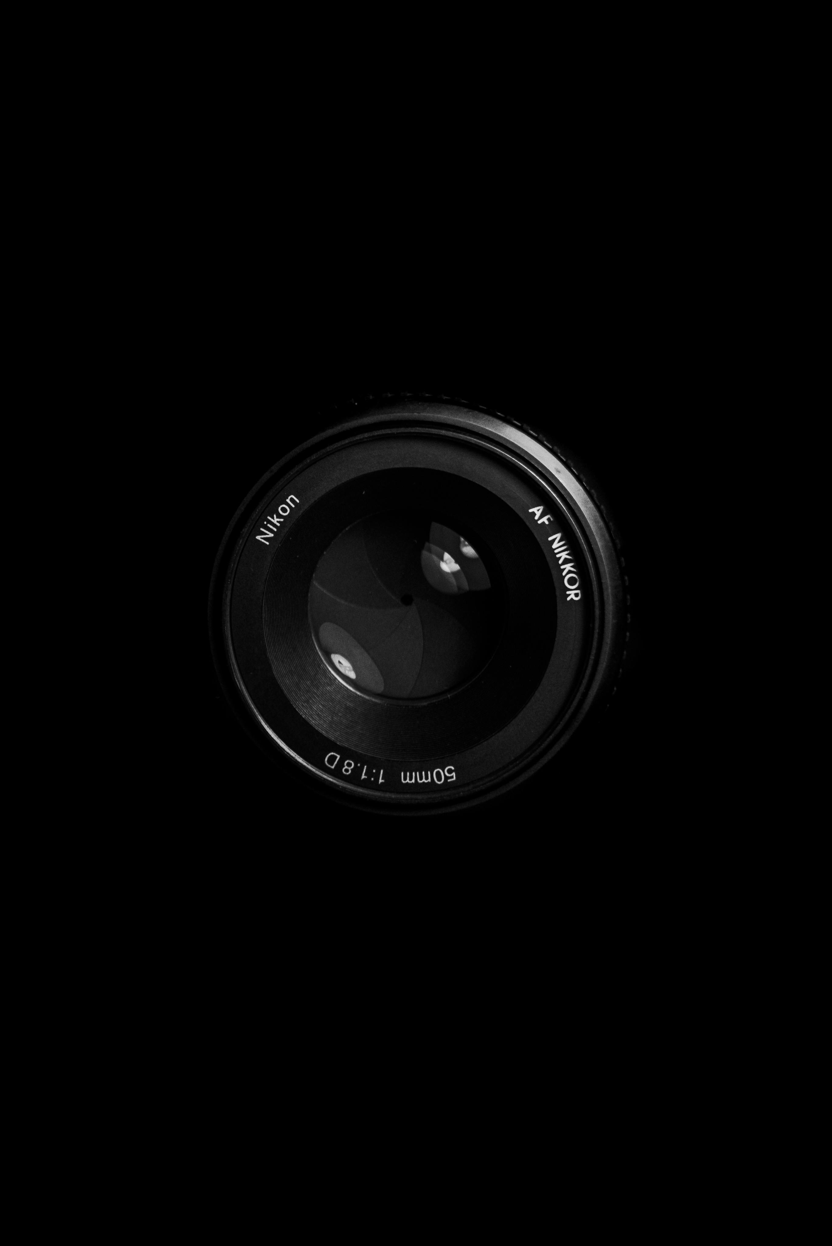 Black Camera Lens on Black Surface · Free Stock Photo