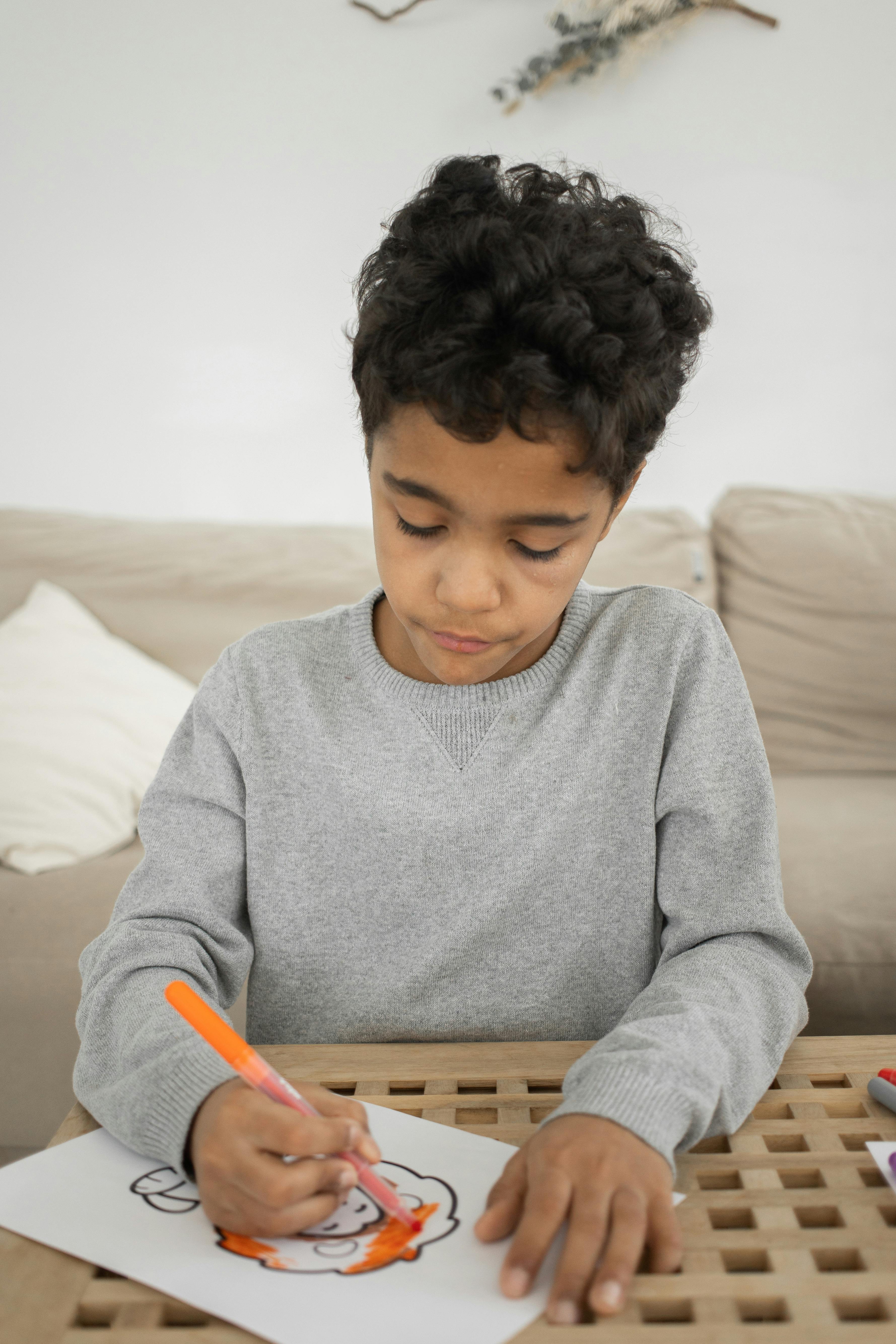 Unrecognizable black children coloring pictures · Free Stock Photo