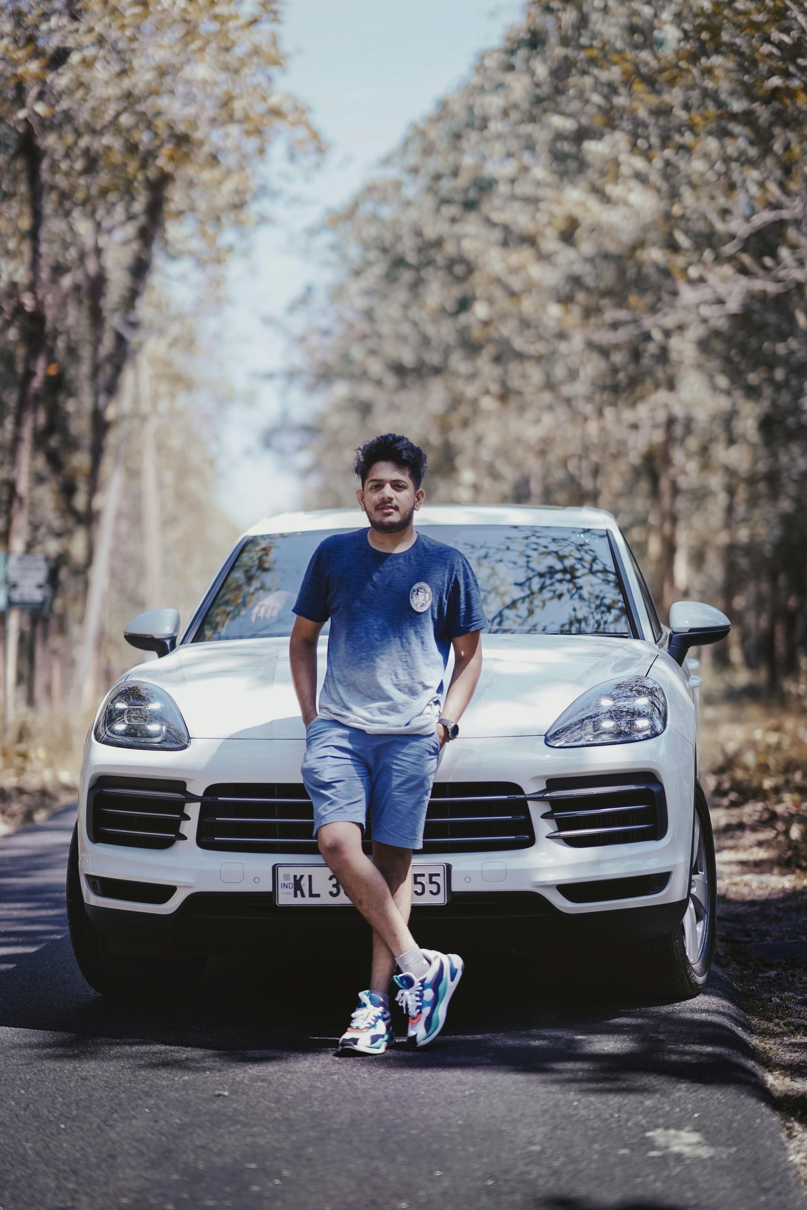 Man Hanging Out of the Car Window · Free Stock Photo