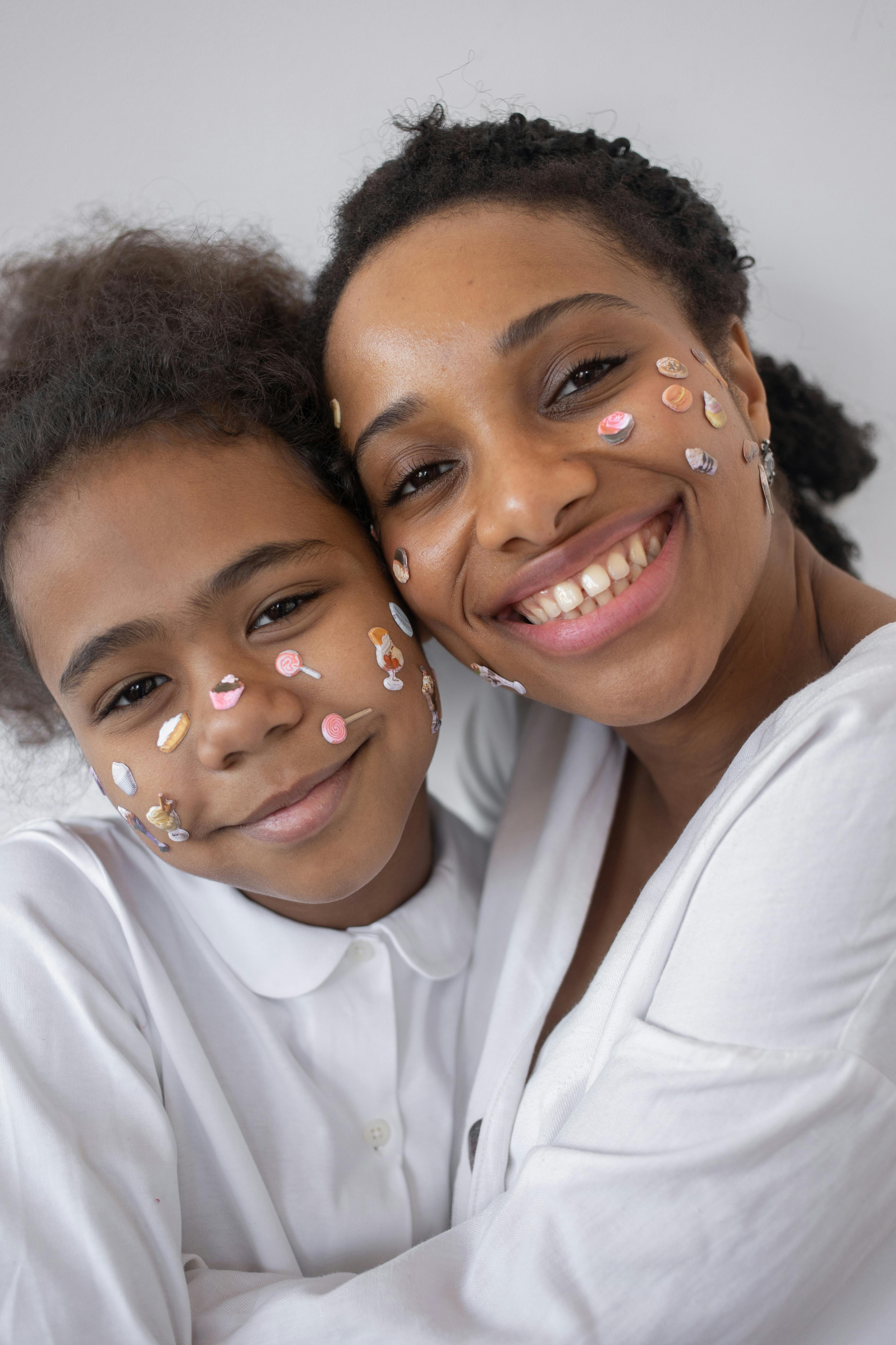 Girls with Stickers on Faces · Free Stock Photo