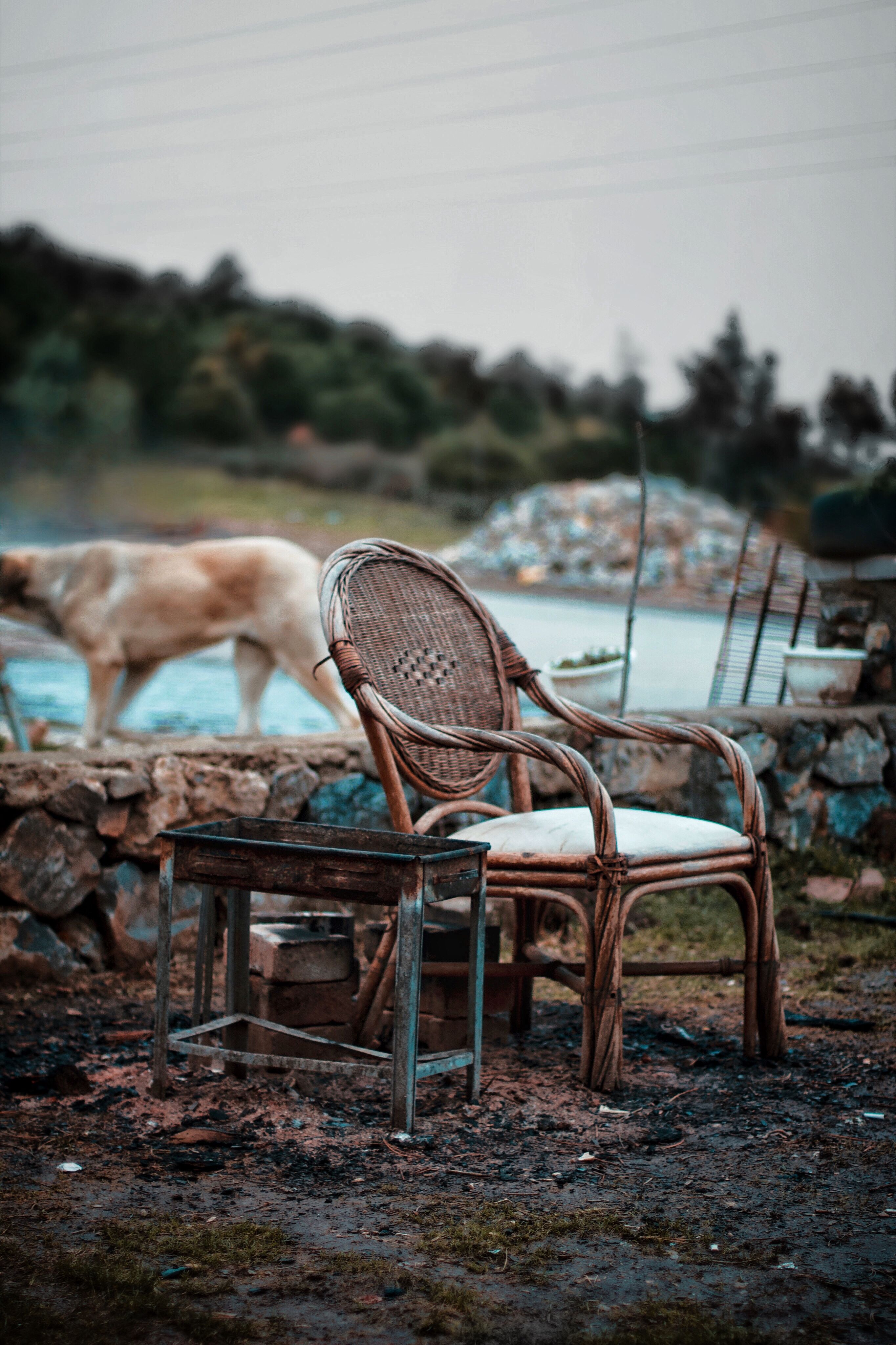 A Brown Wooden Chair on Dirt Ground · Free Stock Photo