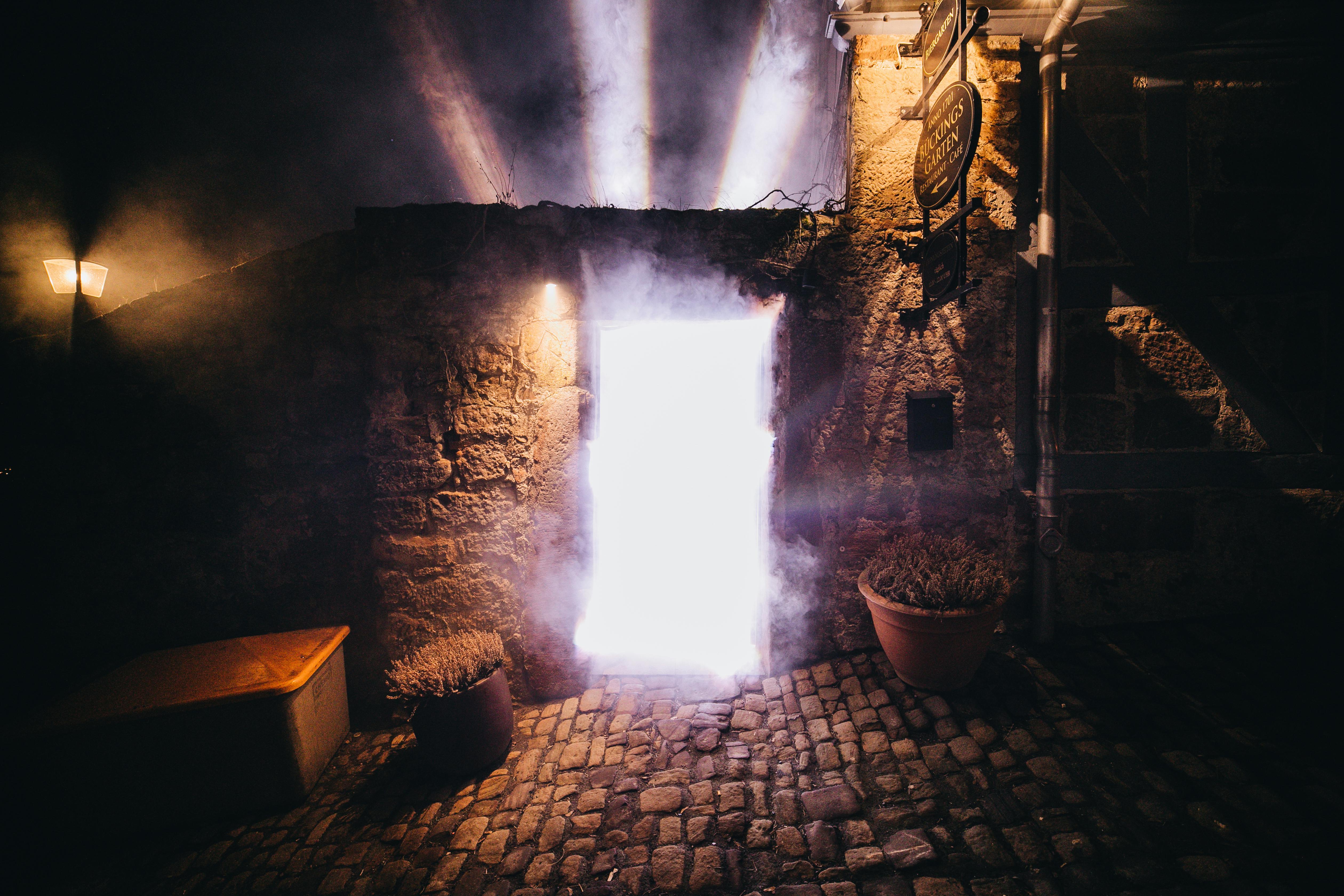 Interior of an Old Stone Building with Open Door · Free Stock Photo
