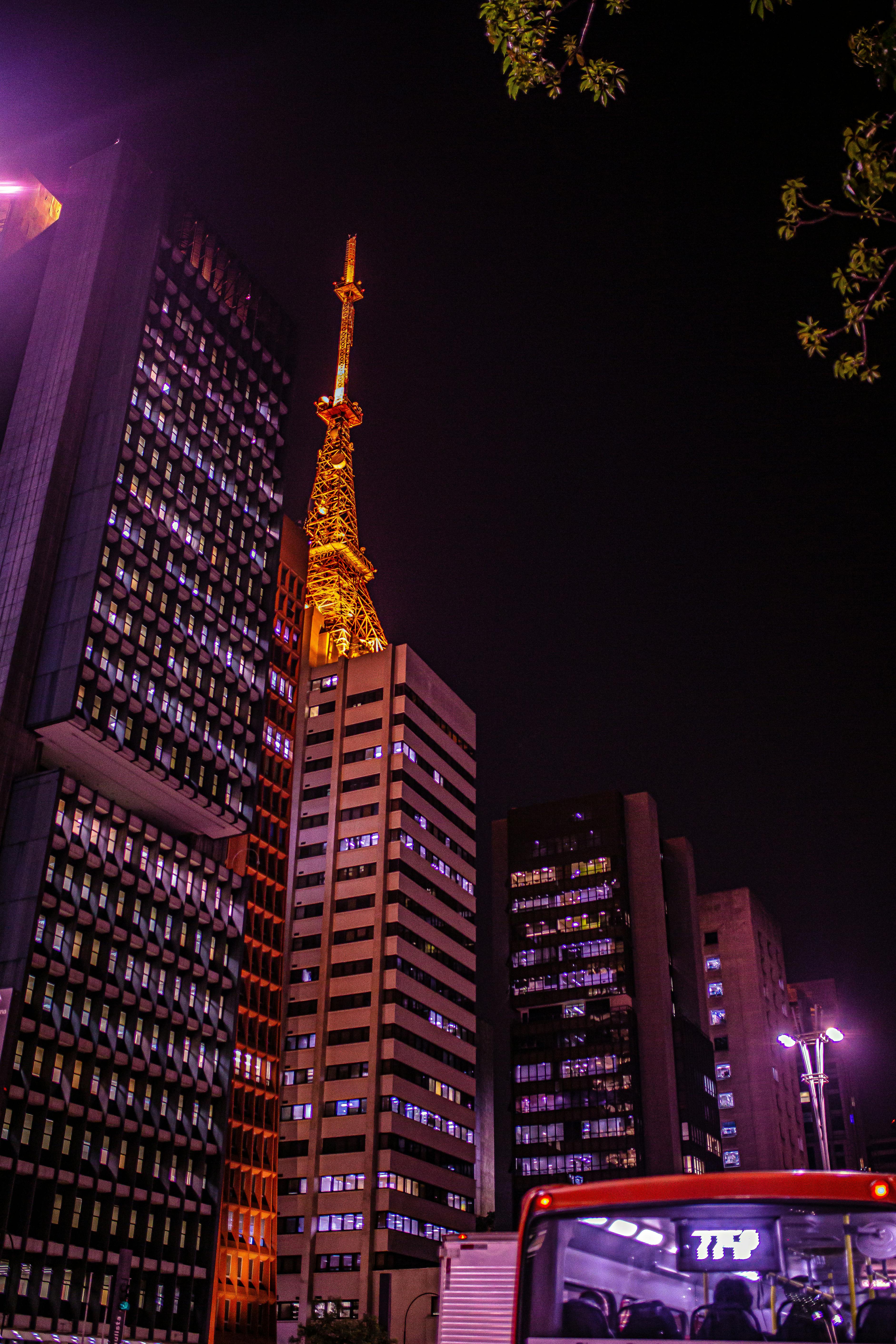 City Buildings During Night Time · Free Stock Photo