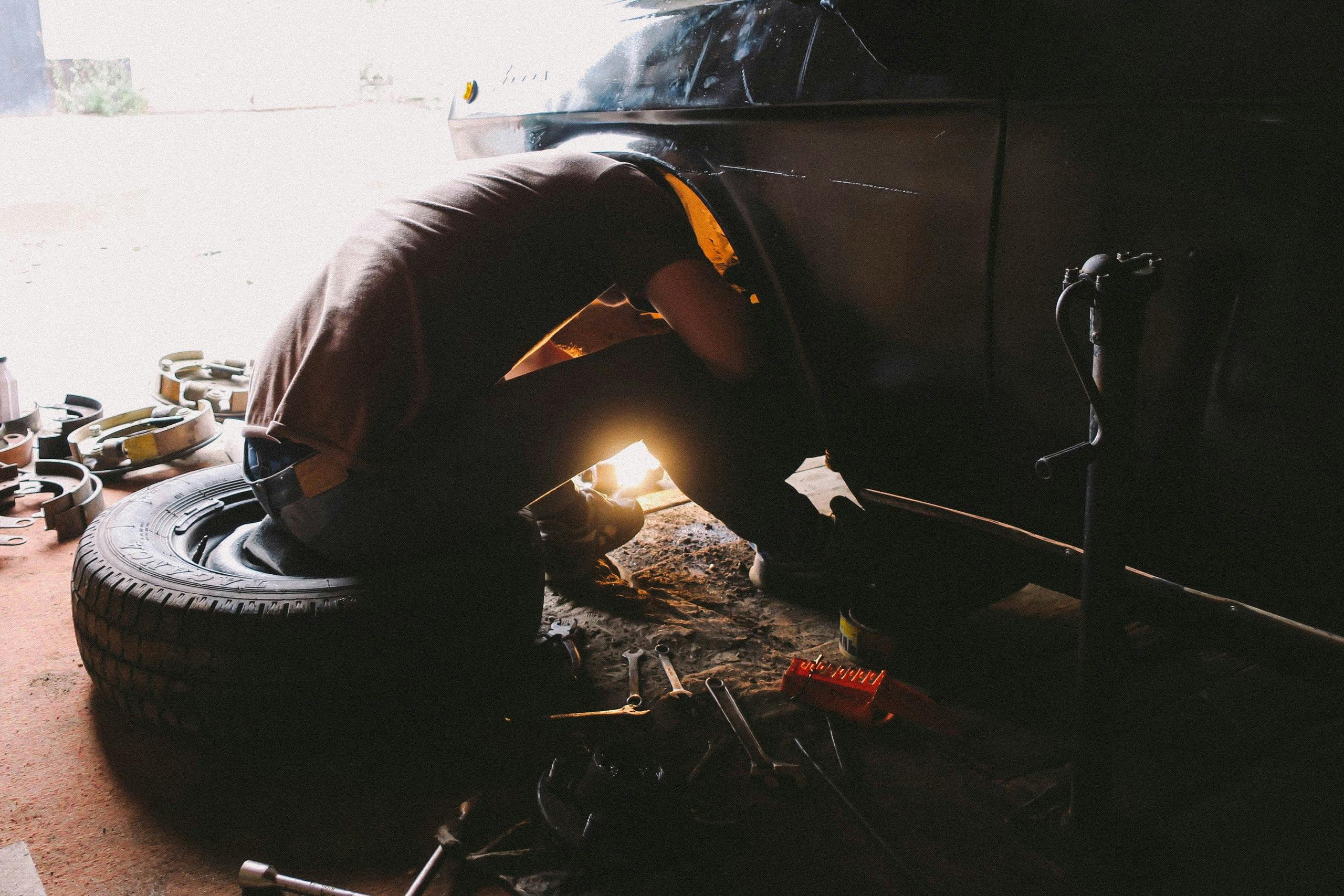 Man Repairing a Car · Free Stock Photo