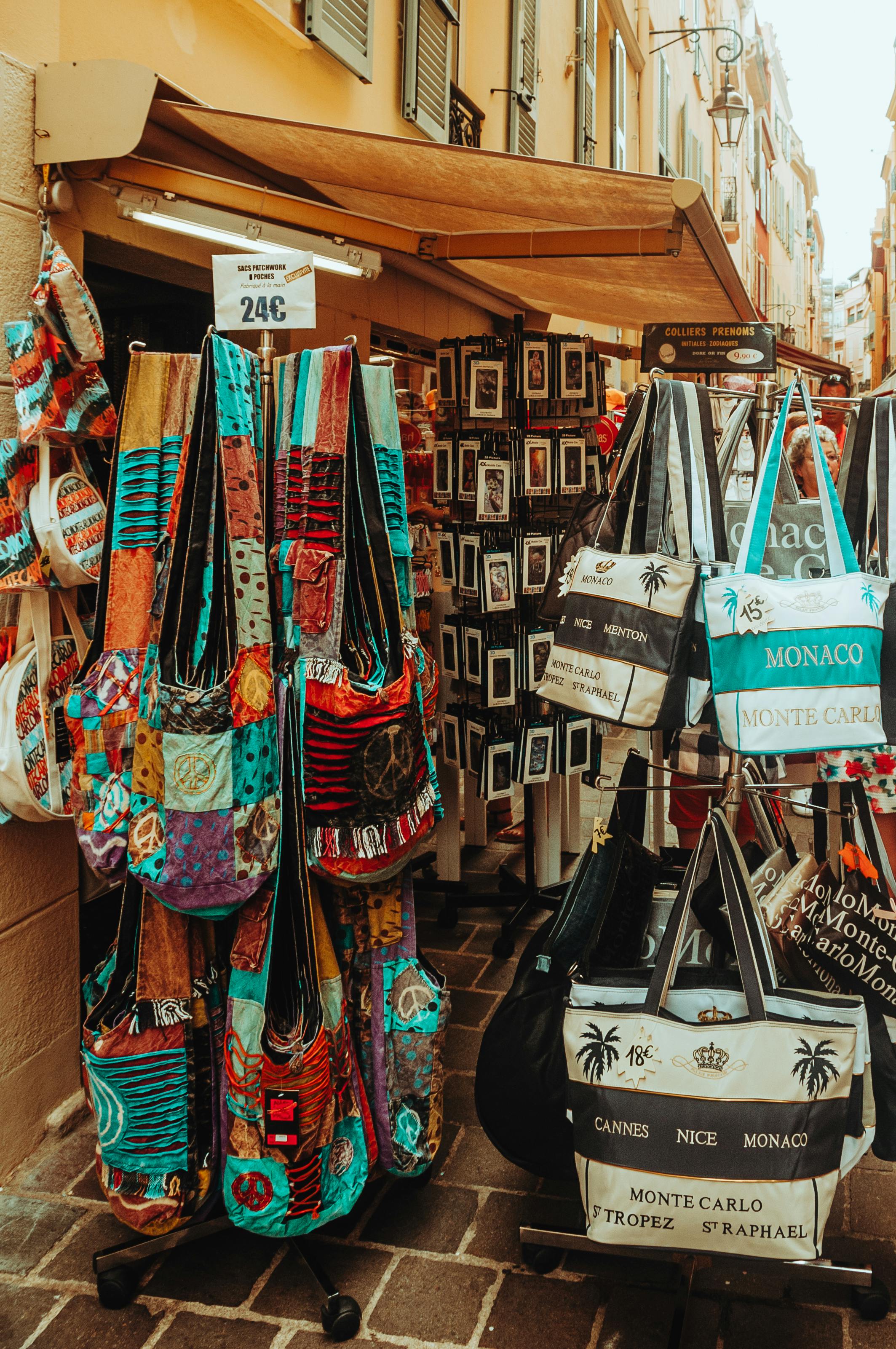 Souvenir Shop with Bags and Postcards · Free Stock Photo