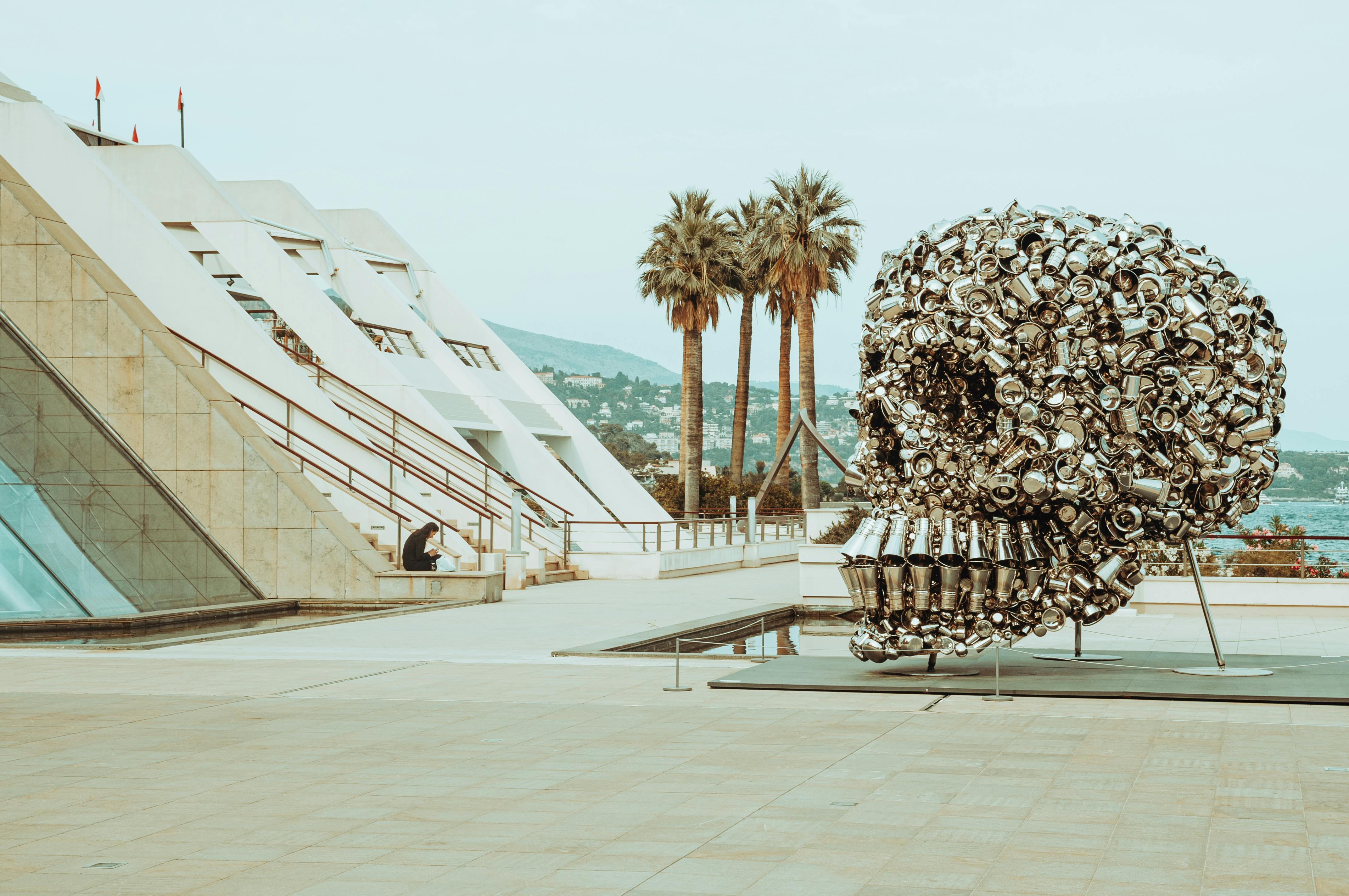 Skull Statue near Building · Free Stock Photo