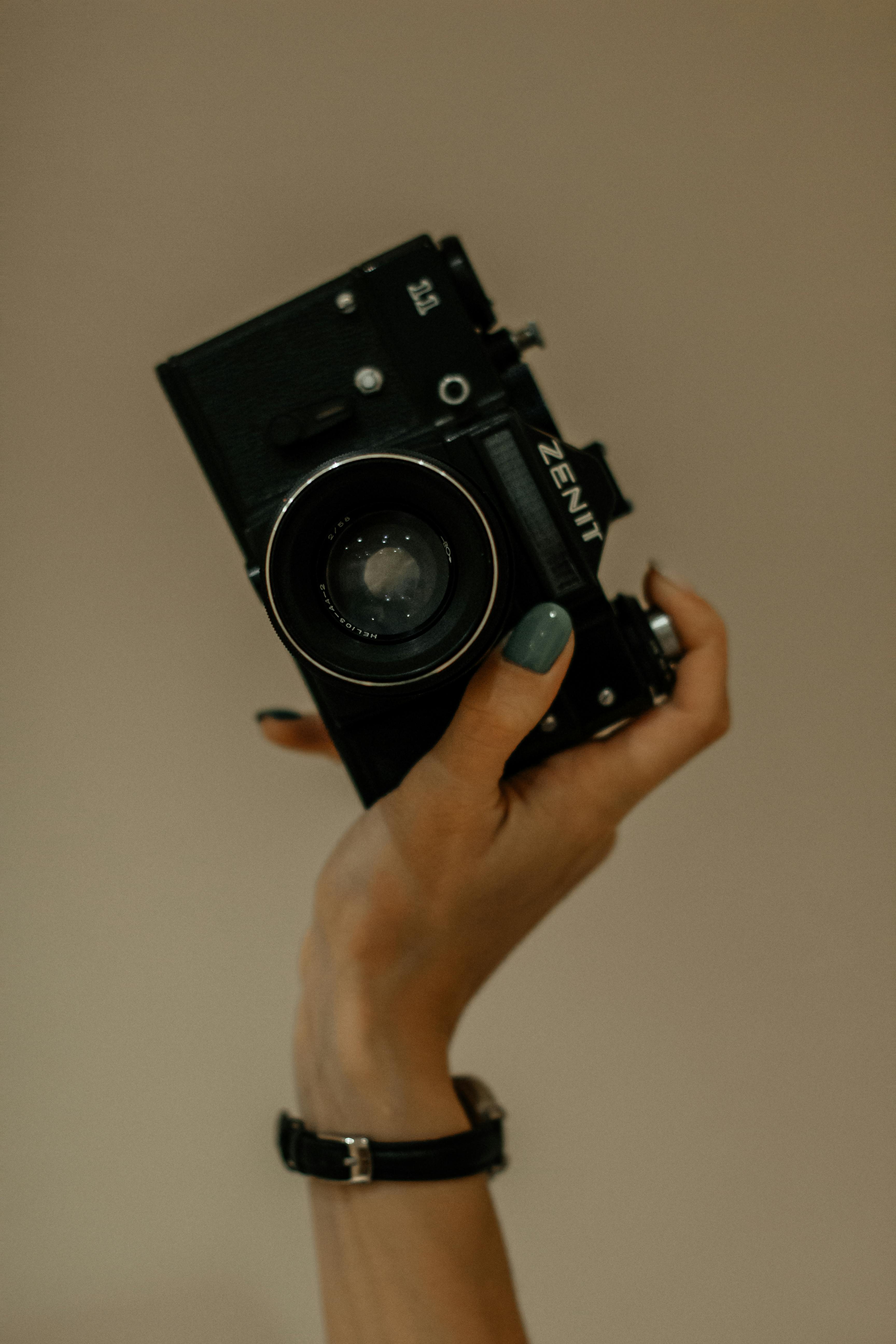 A Person Holding a Camera · Free Stock Photo