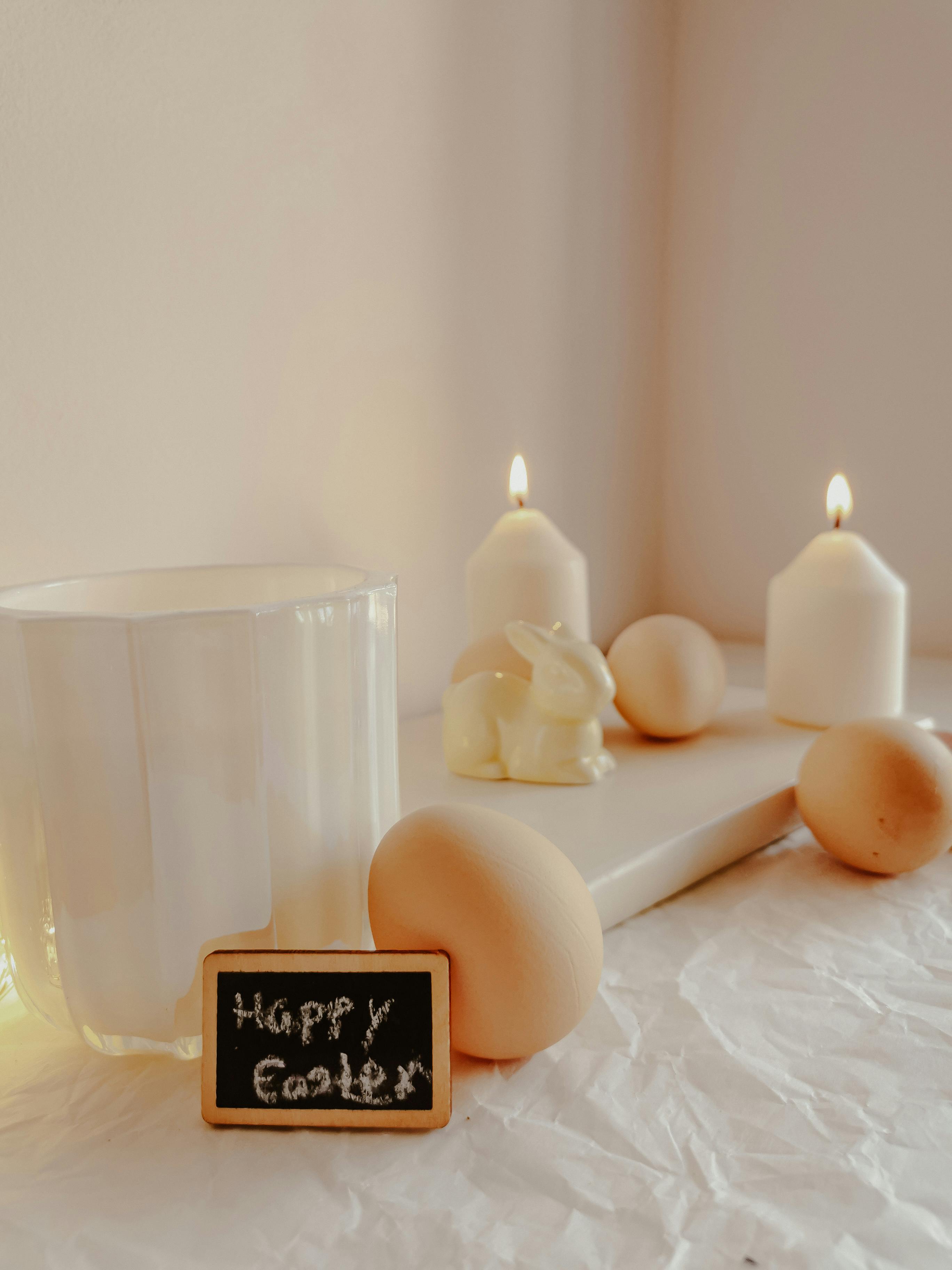 Eggs And Lighted Candle On Table · Free Stock Photo