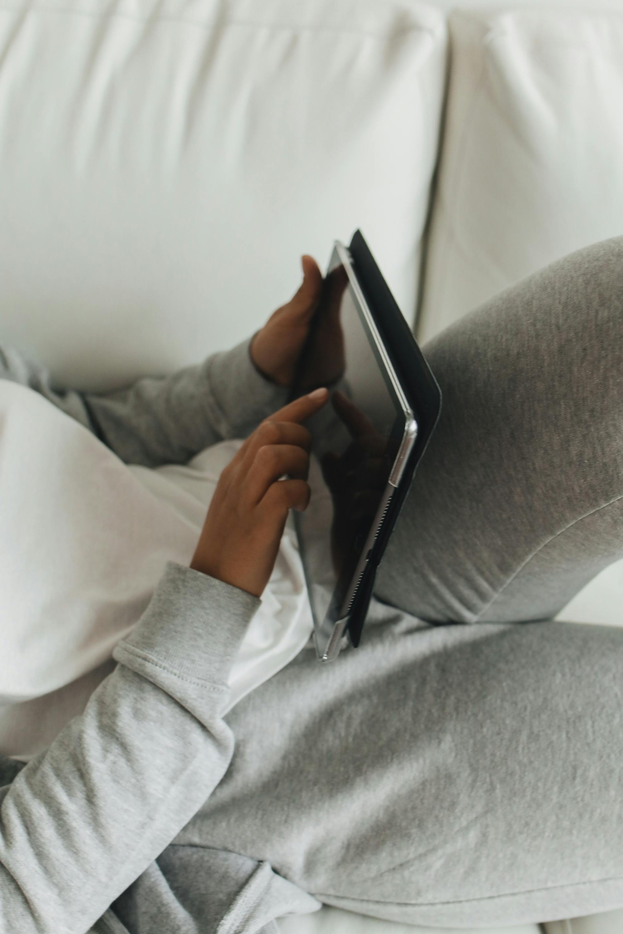 A Woman Using a Tablet · Free Stock Photo