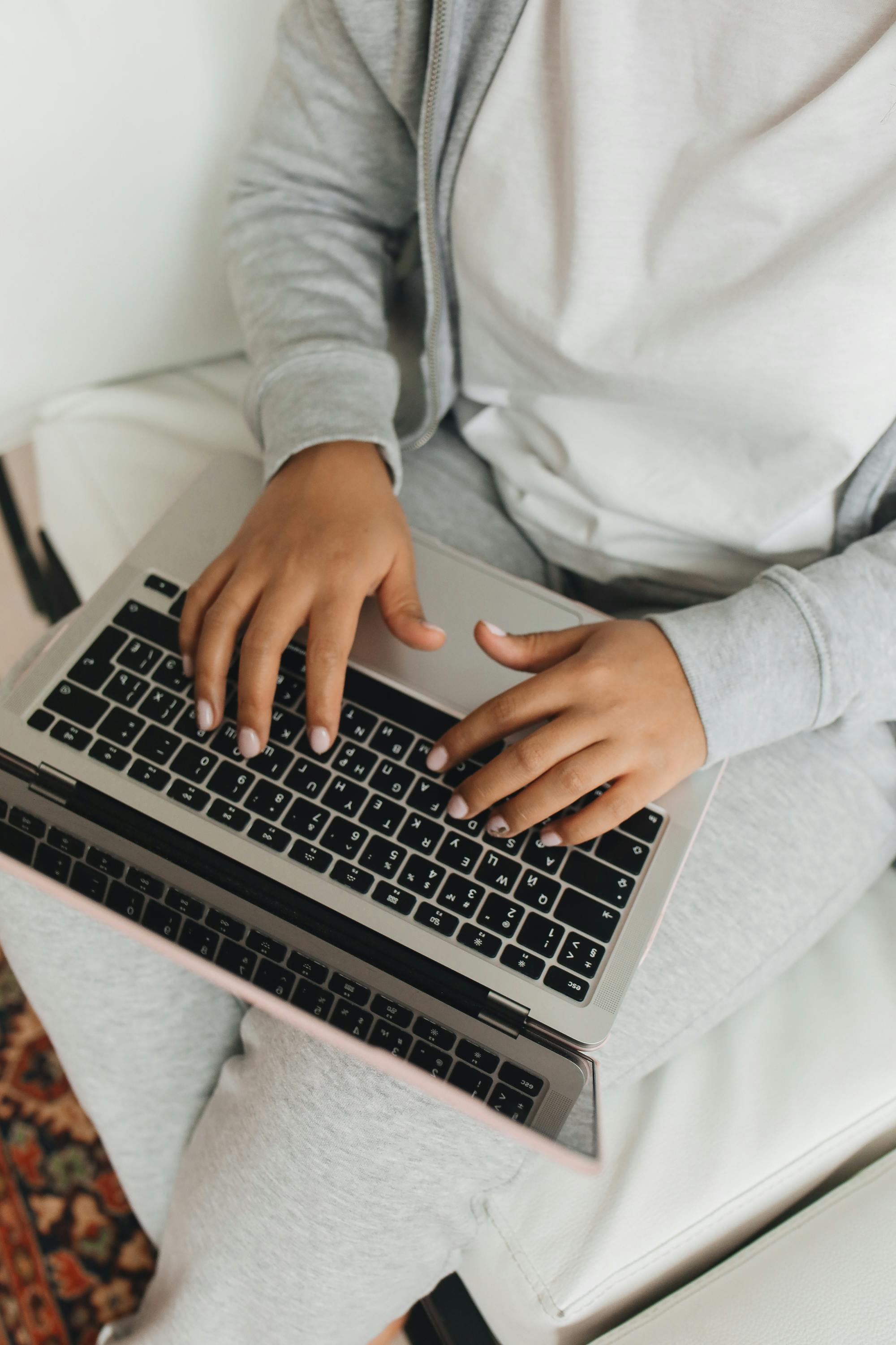 Person Using a Laptop Computer · Free Stock Photo
