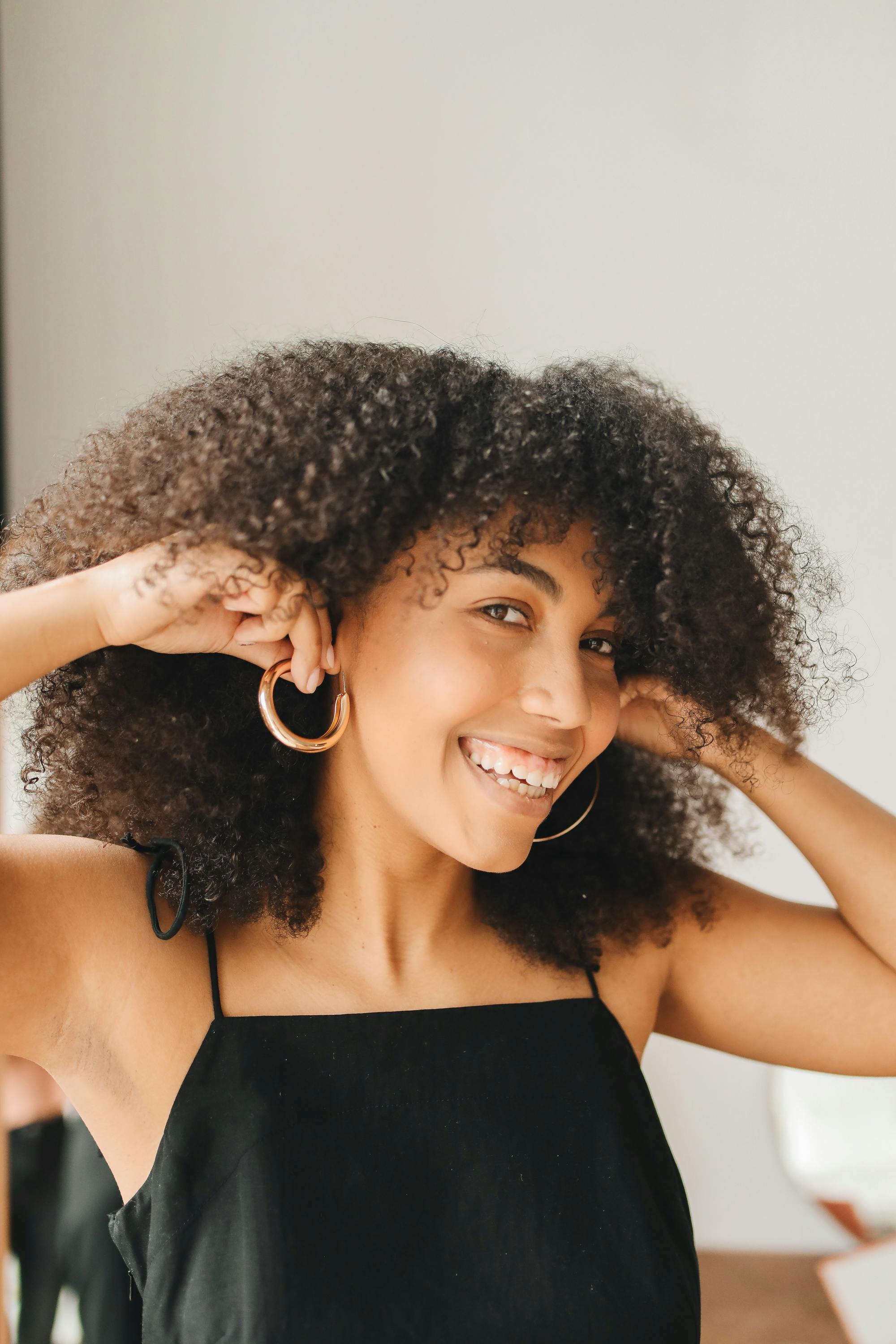 Woman in Black Spaghetti Strap Top · Free Stock Photo