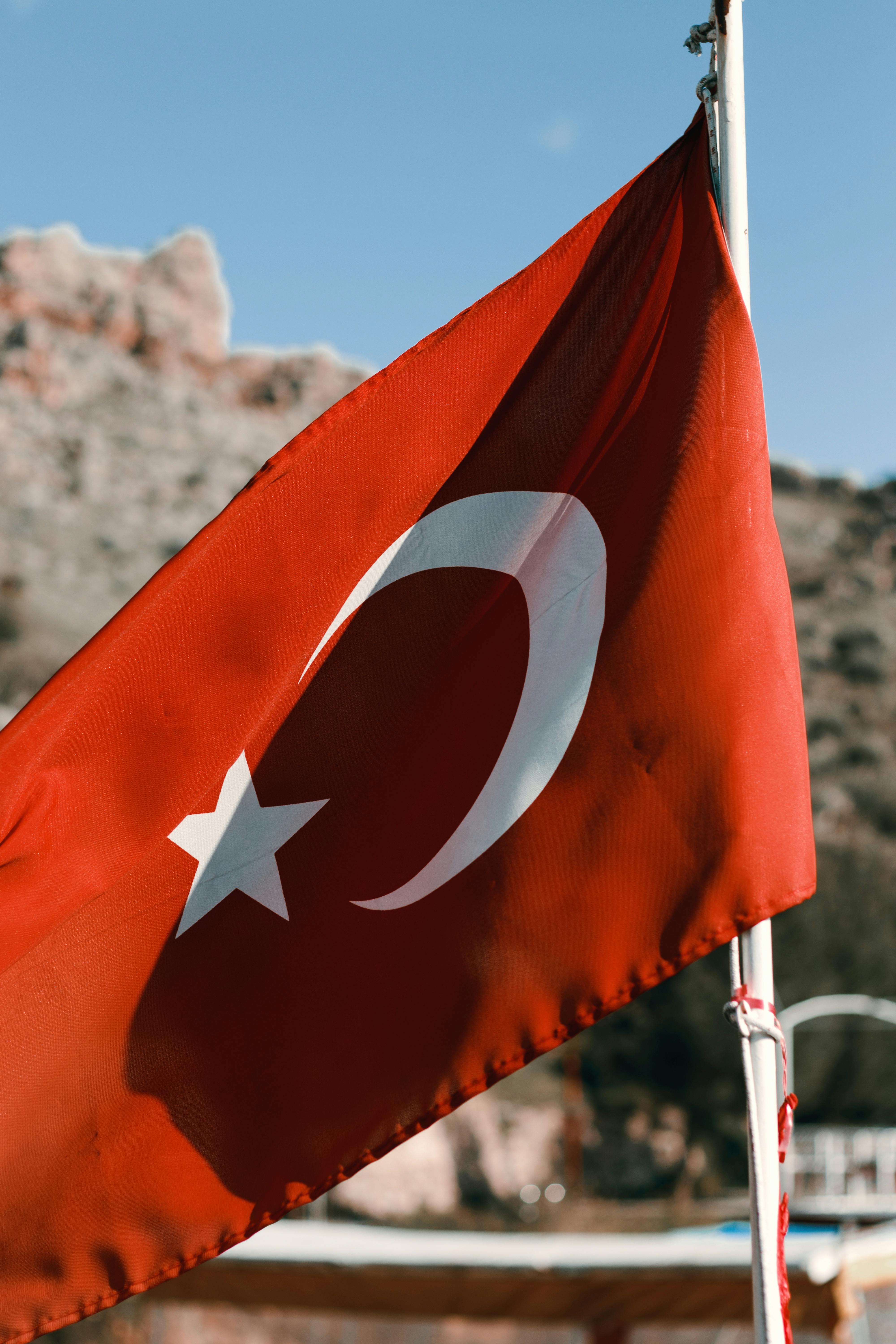 Close Up Photo of a Red Flag · Free Stock Photo