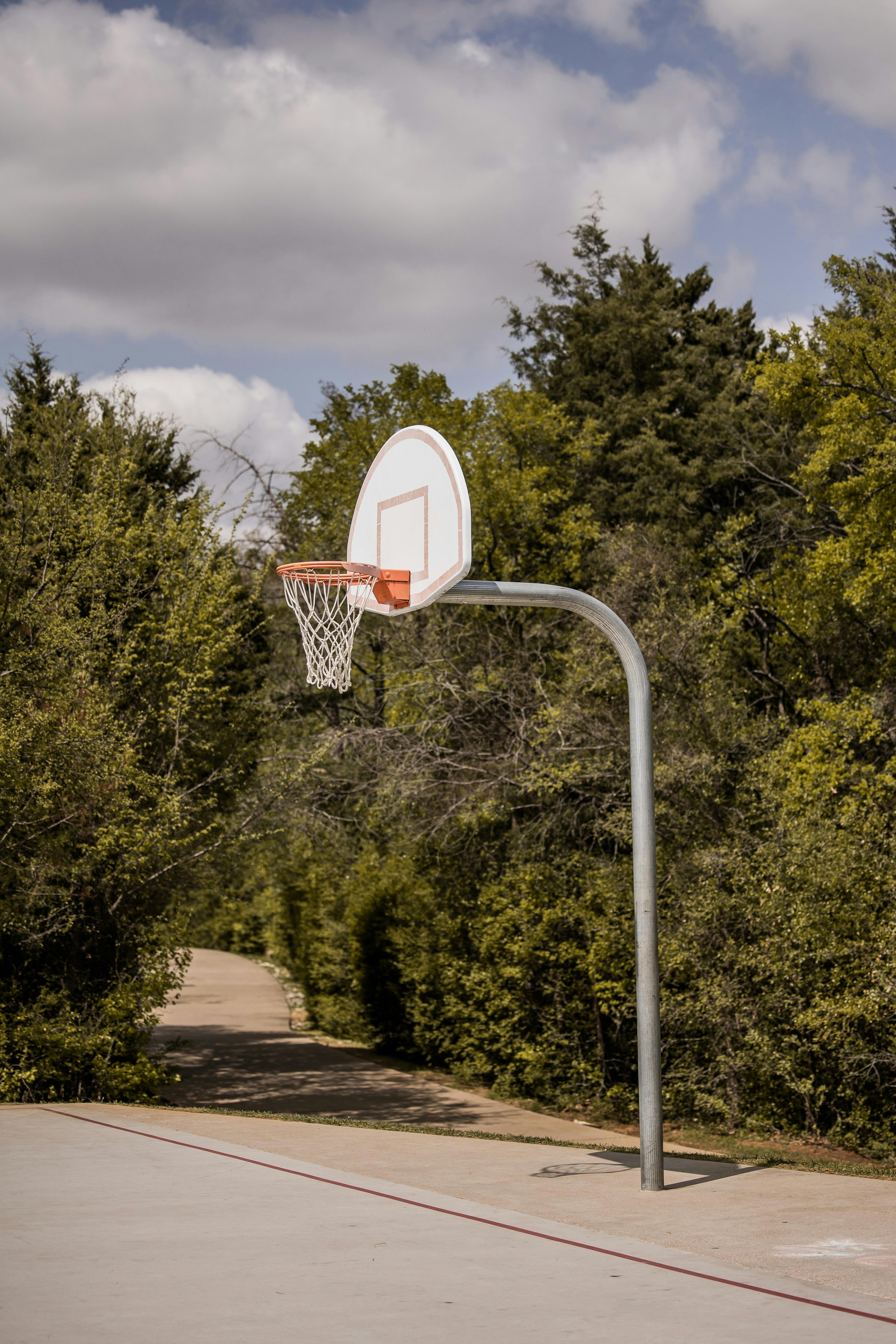 Basketball hoop for practicing active sport in park · Free Stock Photo