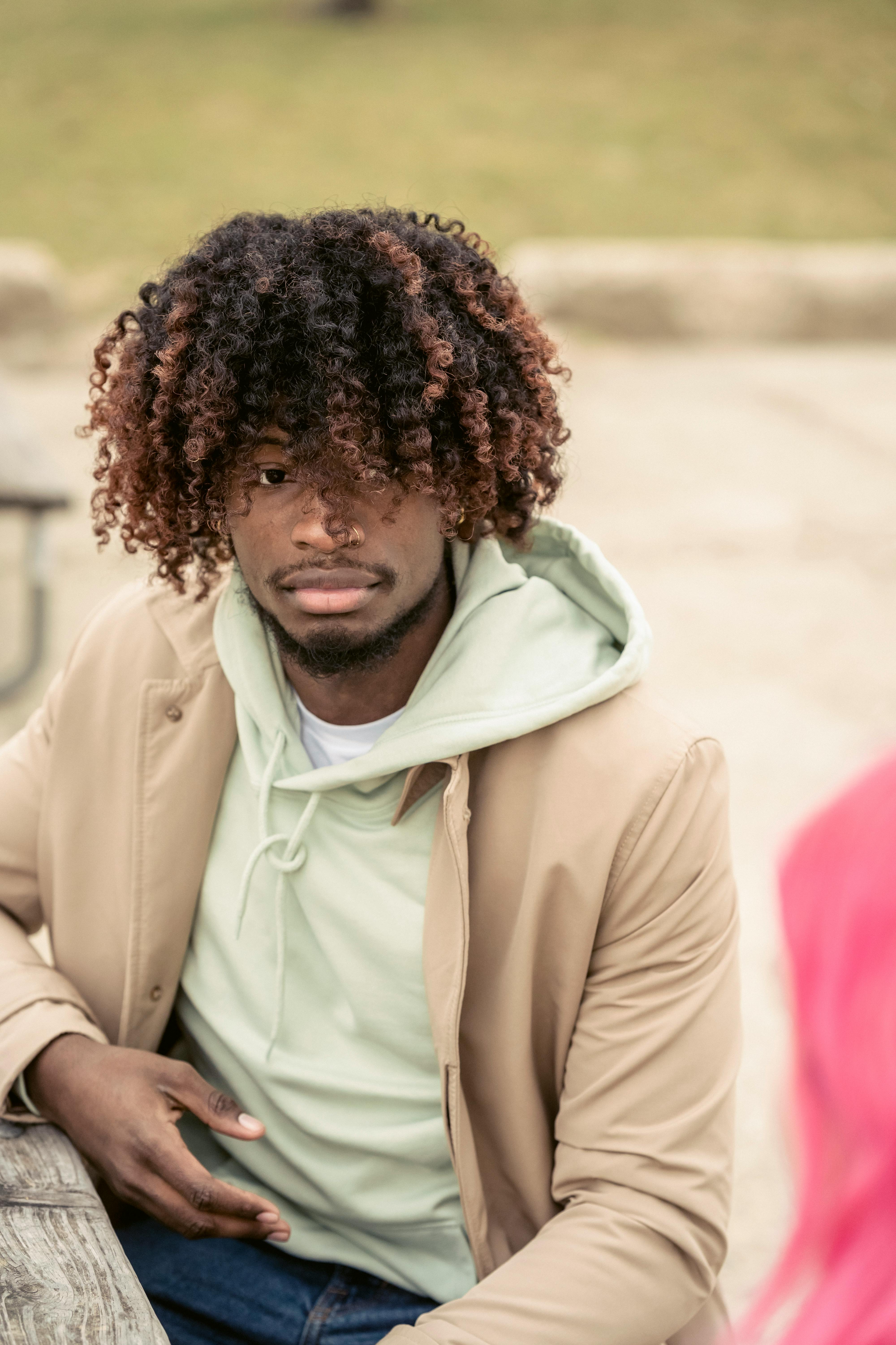 Faceless black man in hoodie · Free Stock Photo
