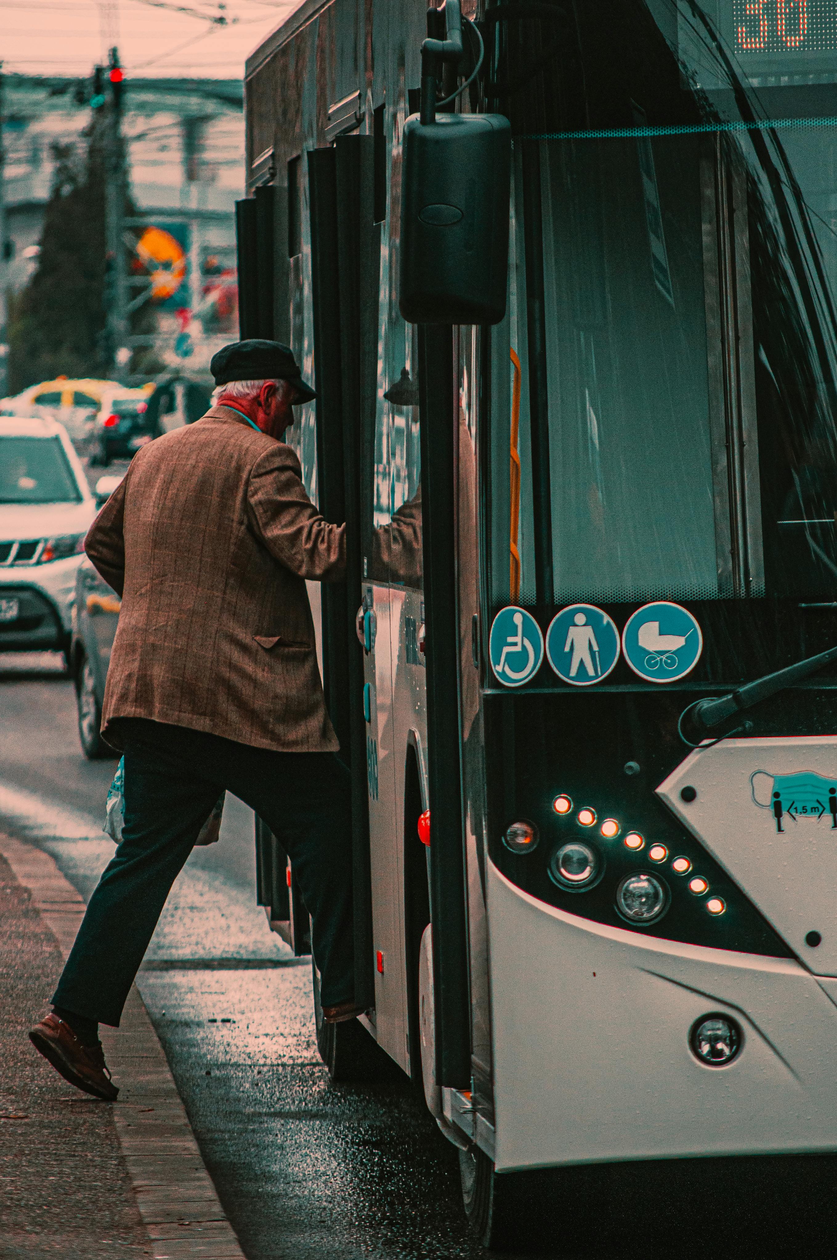People on a Bus Stop in Rain · Free Stock Photo